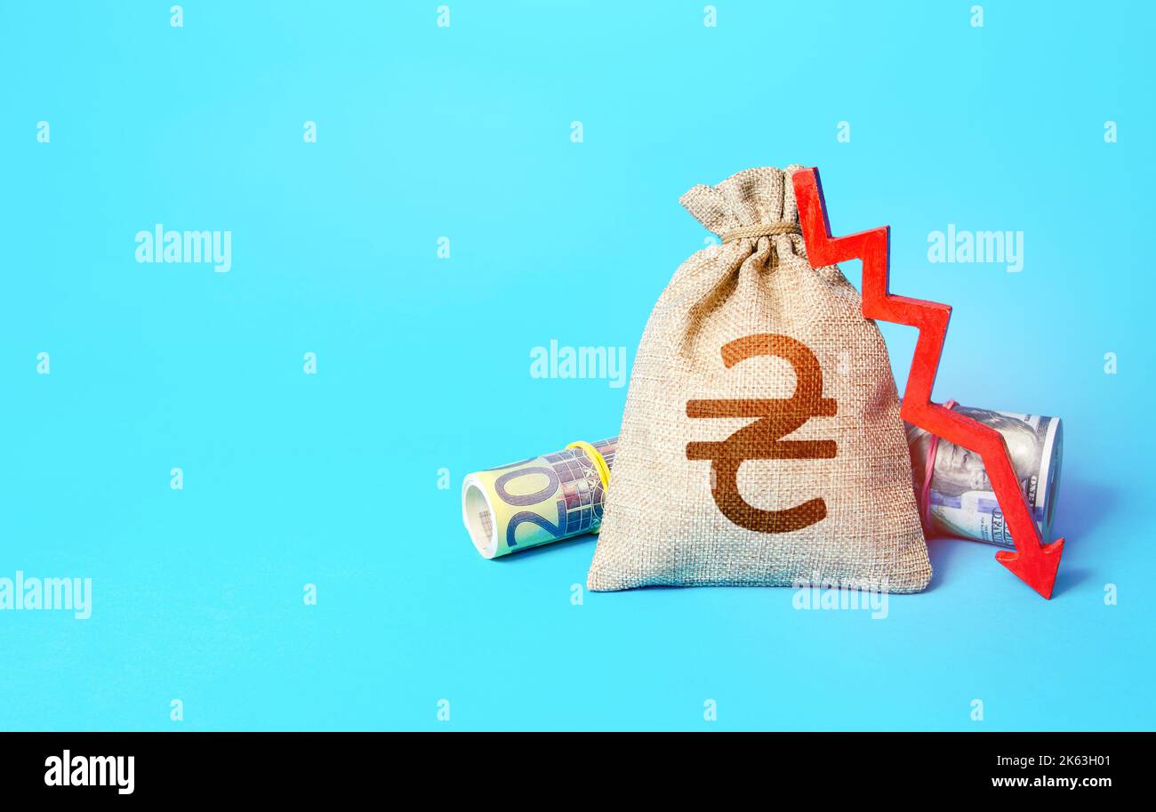 Ukrainian hryvnia money bag and arrow down. Falling economy. Drop in ...