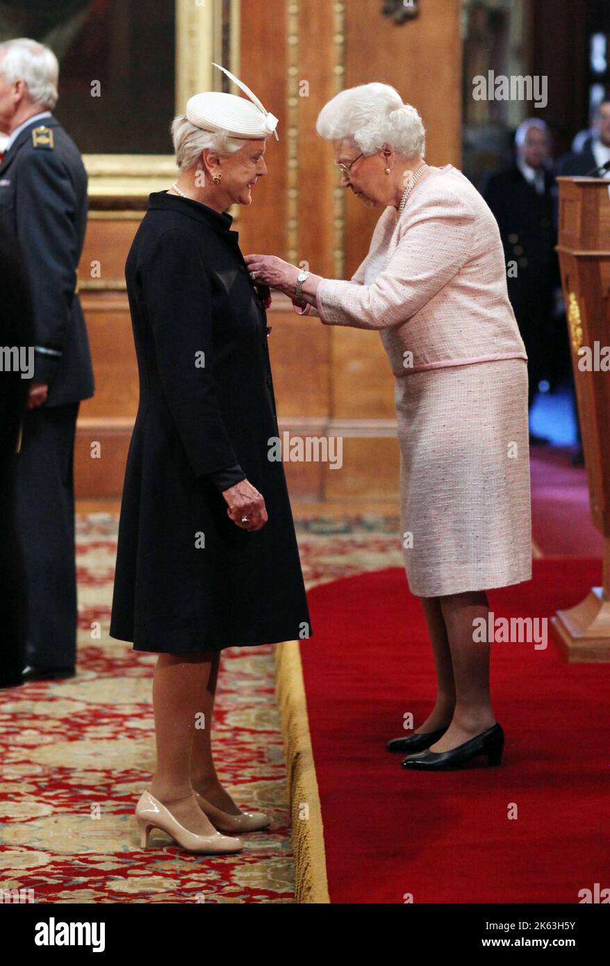 File photo dated 15/04/14 of Angela Lansbury being made a Dame ...