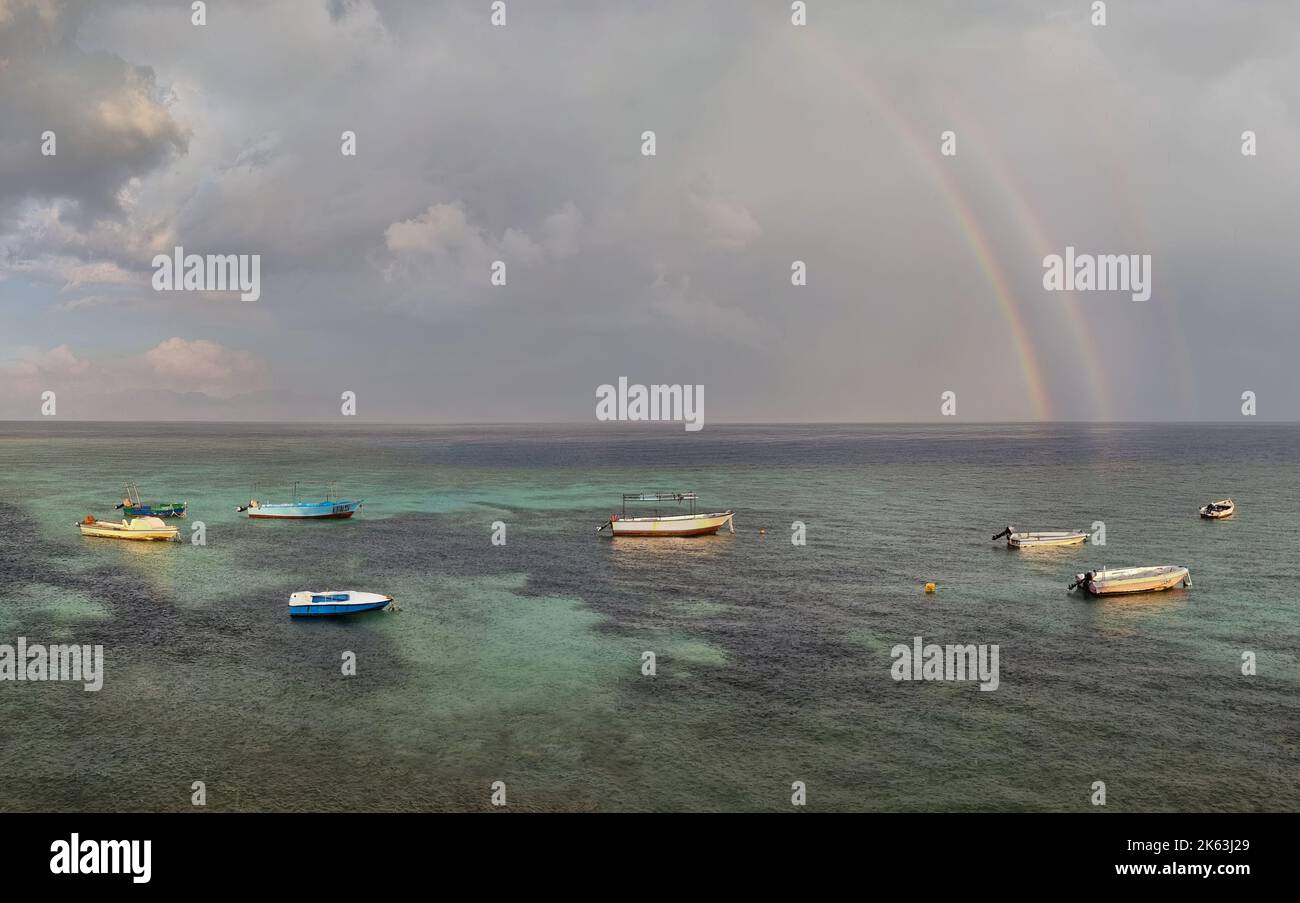 Rainbow and rain on the Red Sea coast in Dahab, Sinai, Egypt Stock ...