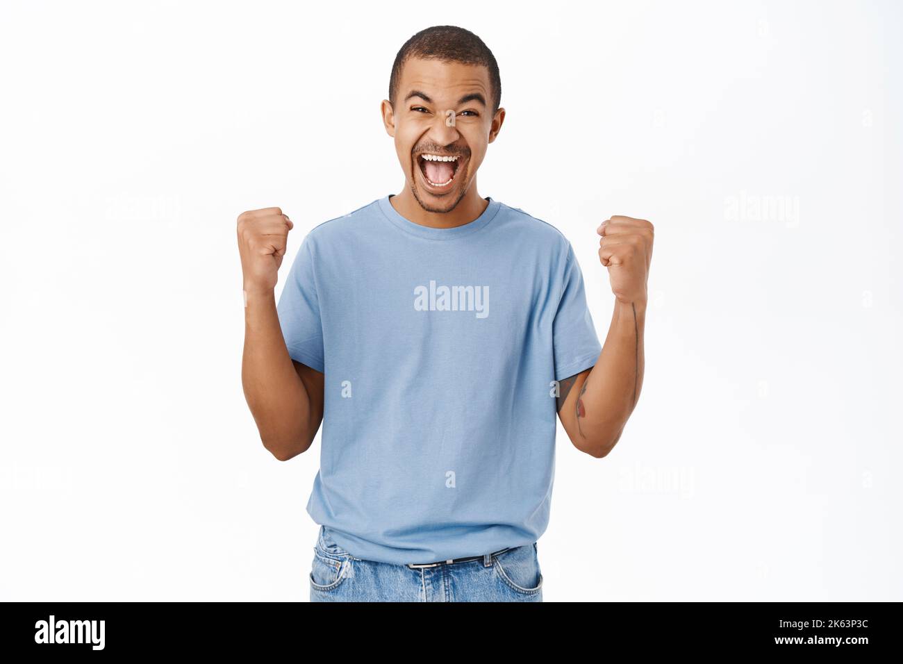 Win, triumphing people. Happy arab man cheering, celebrating victory ...