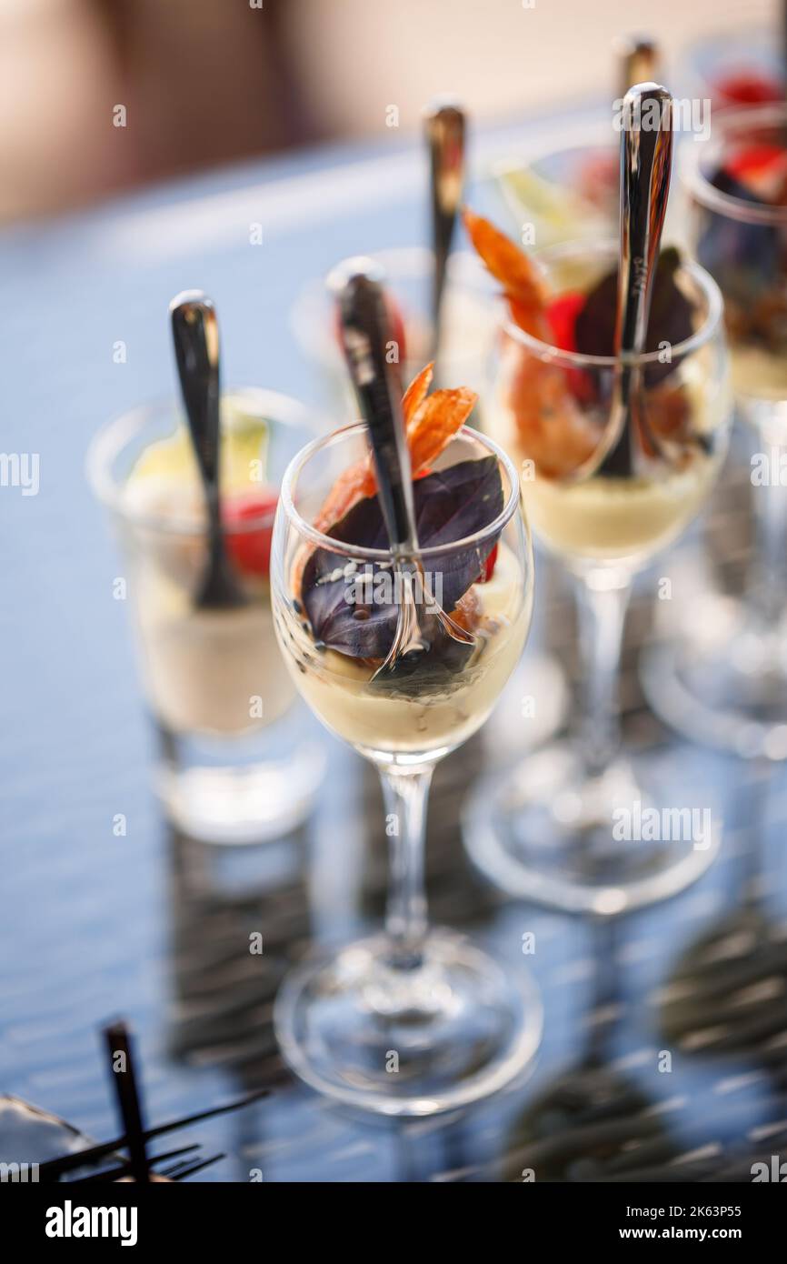 Buffet table for guests at a banquet with various snacks and sandwiches ...