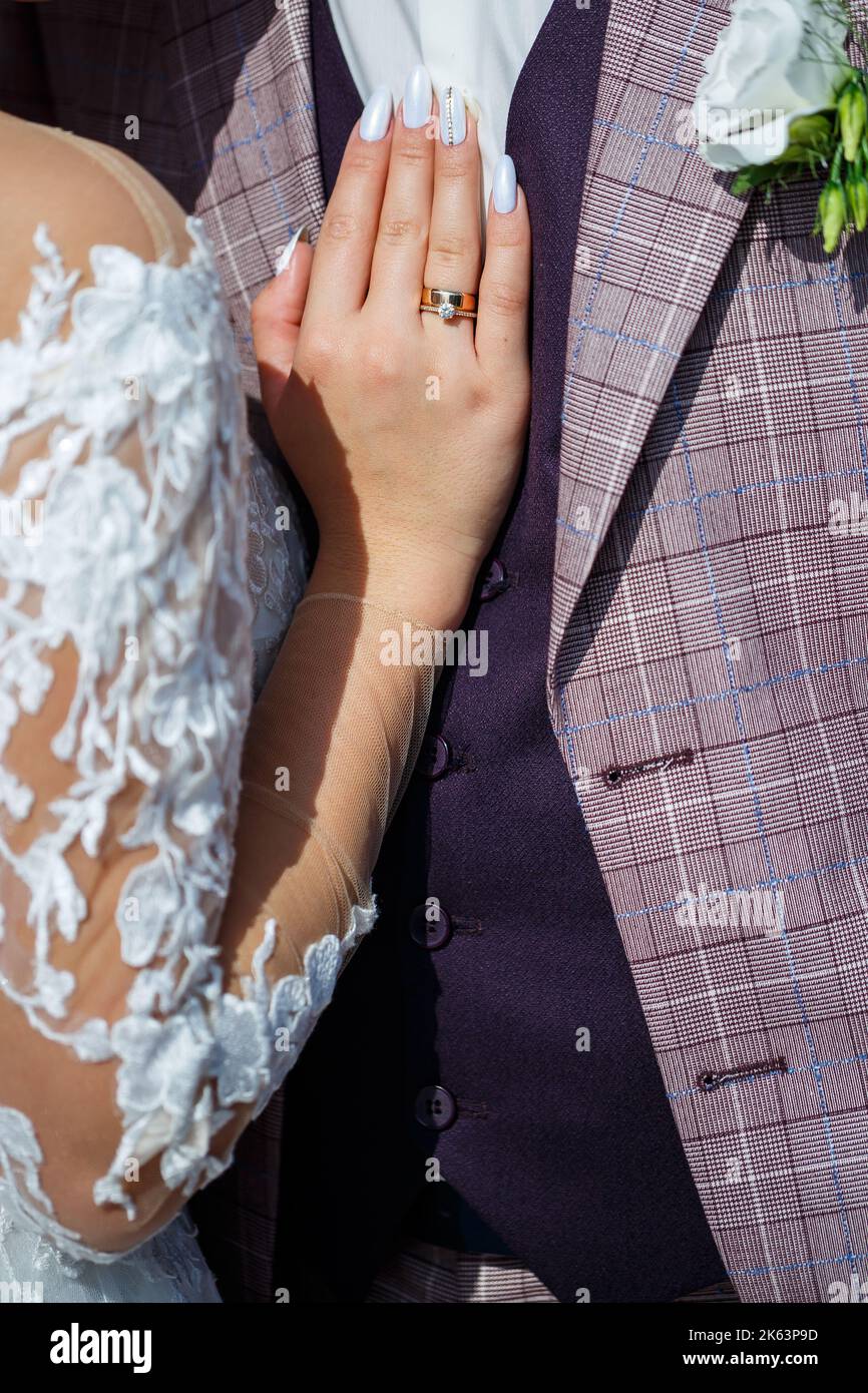 Bride and groom hugging on a wedding day Stock Photo - Alamy