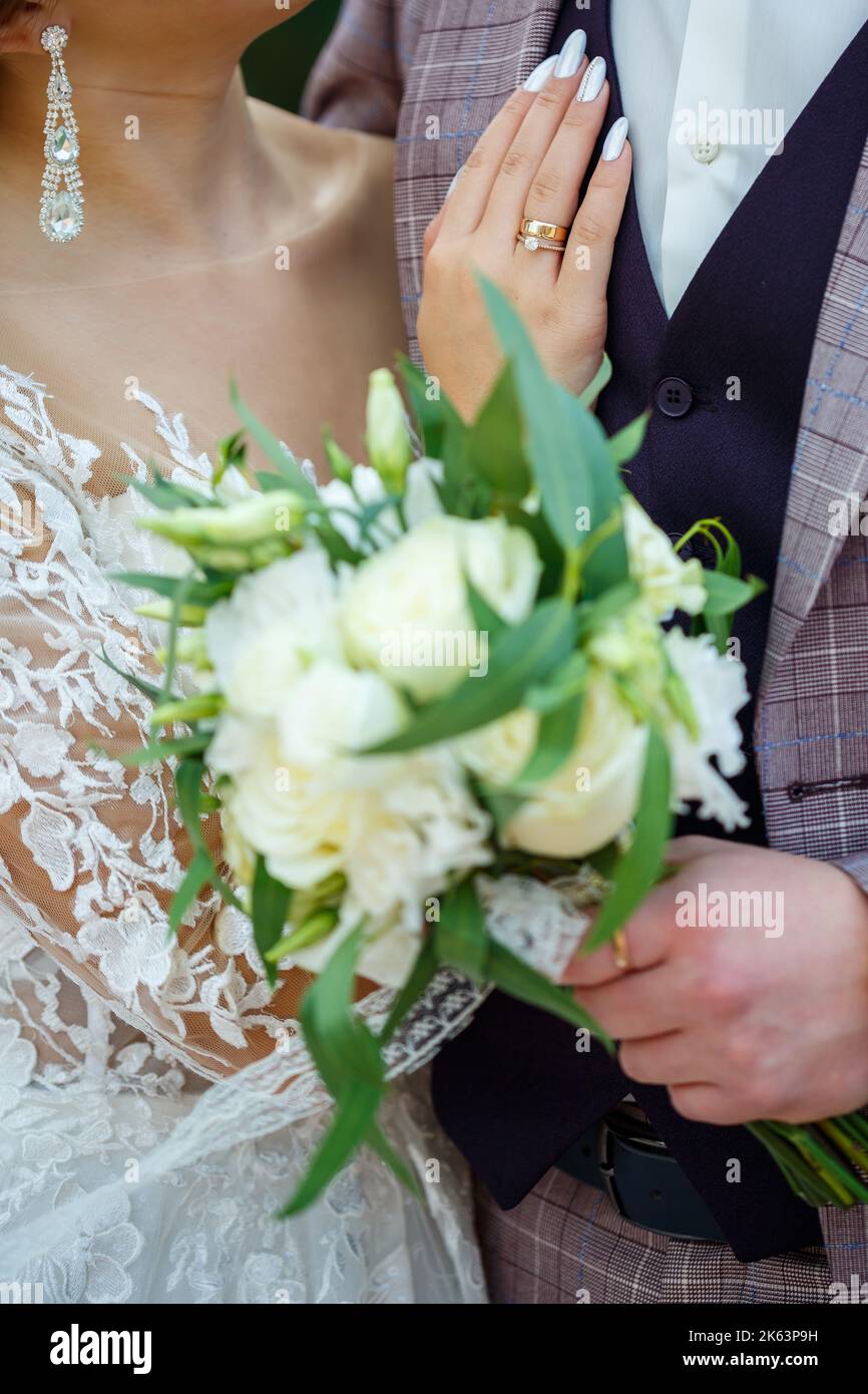 Bride and groom hugging on a wedding day Stock Photo - Alamy