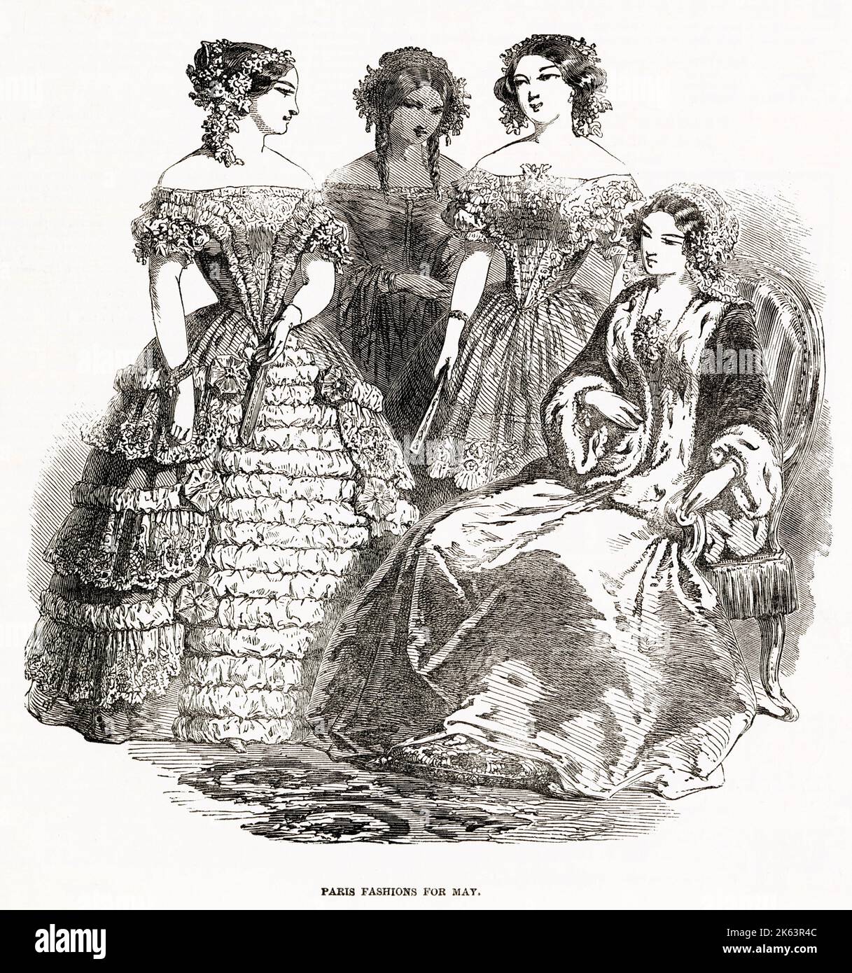 Four women waering the latest fashions of May 1850 Stock Photo - Alamy