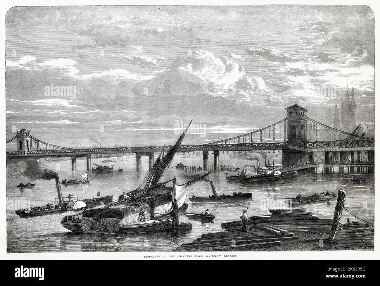 Hungerford Bridge made of wrought iron, a suspension footbridge running ...