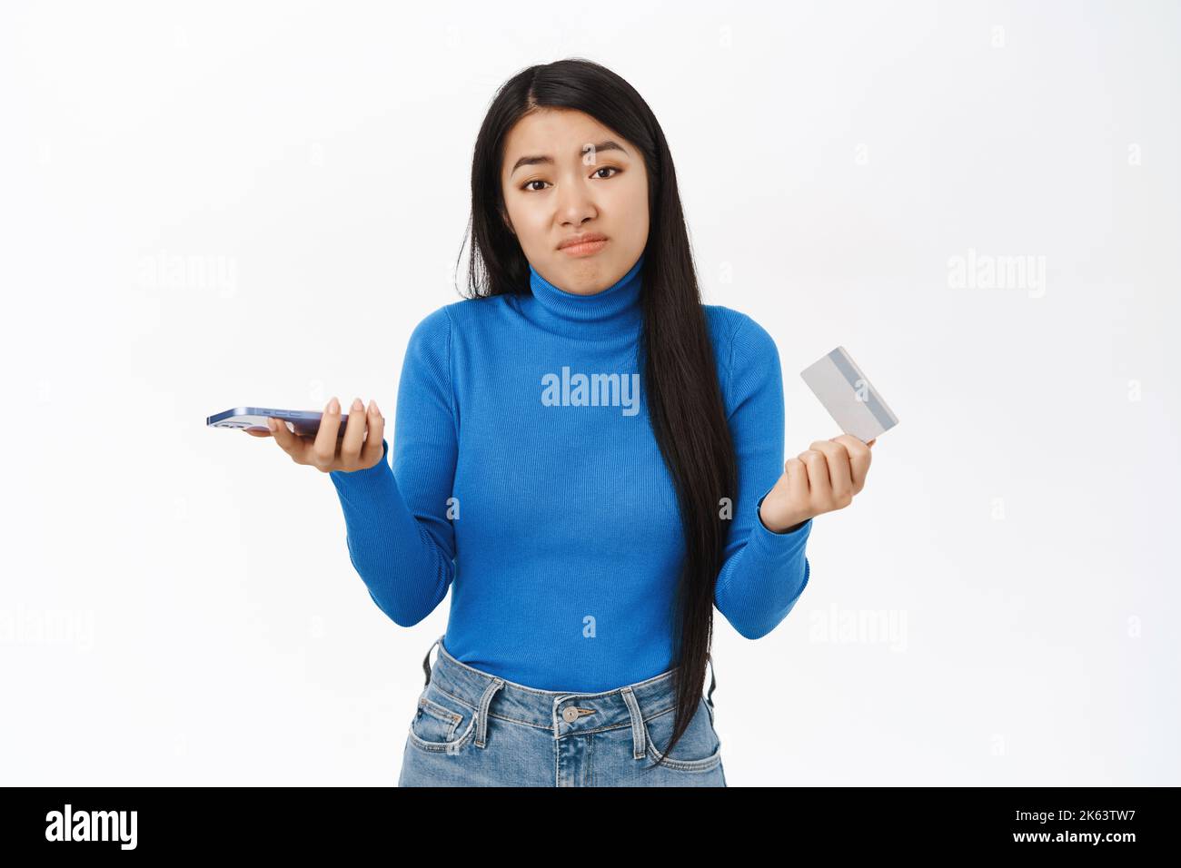 Confused asian girl hi-res stock photography and images - Alamy