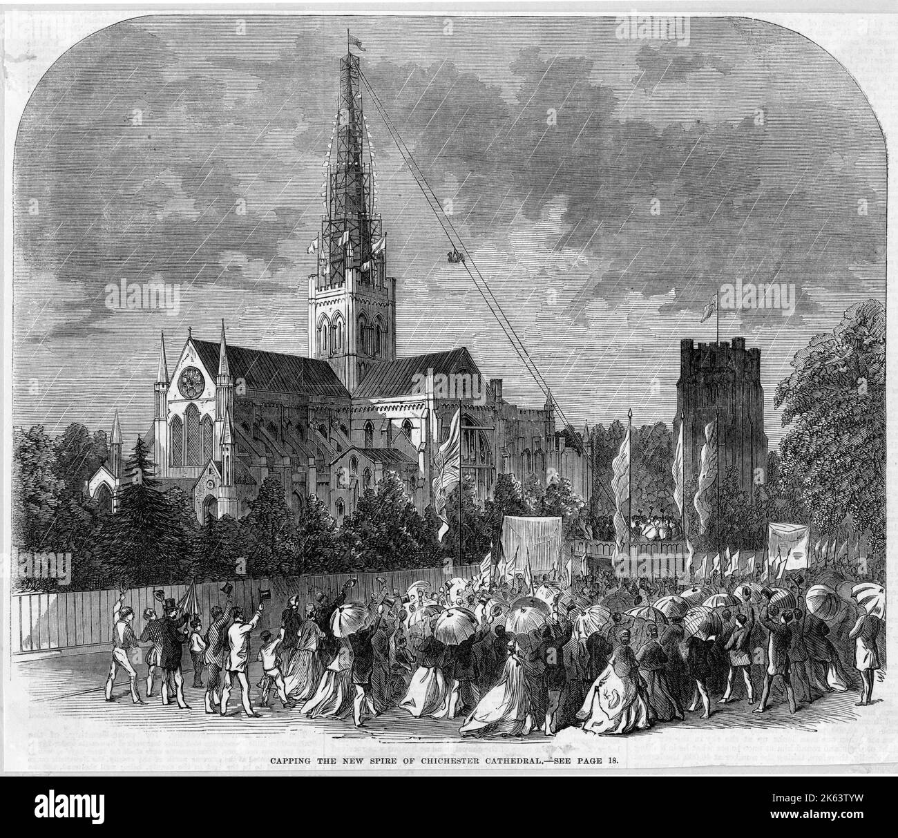 The good folk of Chichester, West Sussex, gather to watch the spire of ...