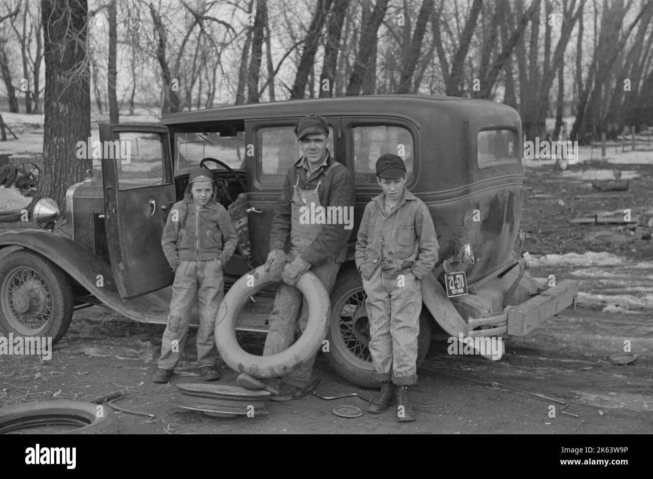 Henry Monk and two of his stepchildren on their farm near Ruthven, Iowa ...