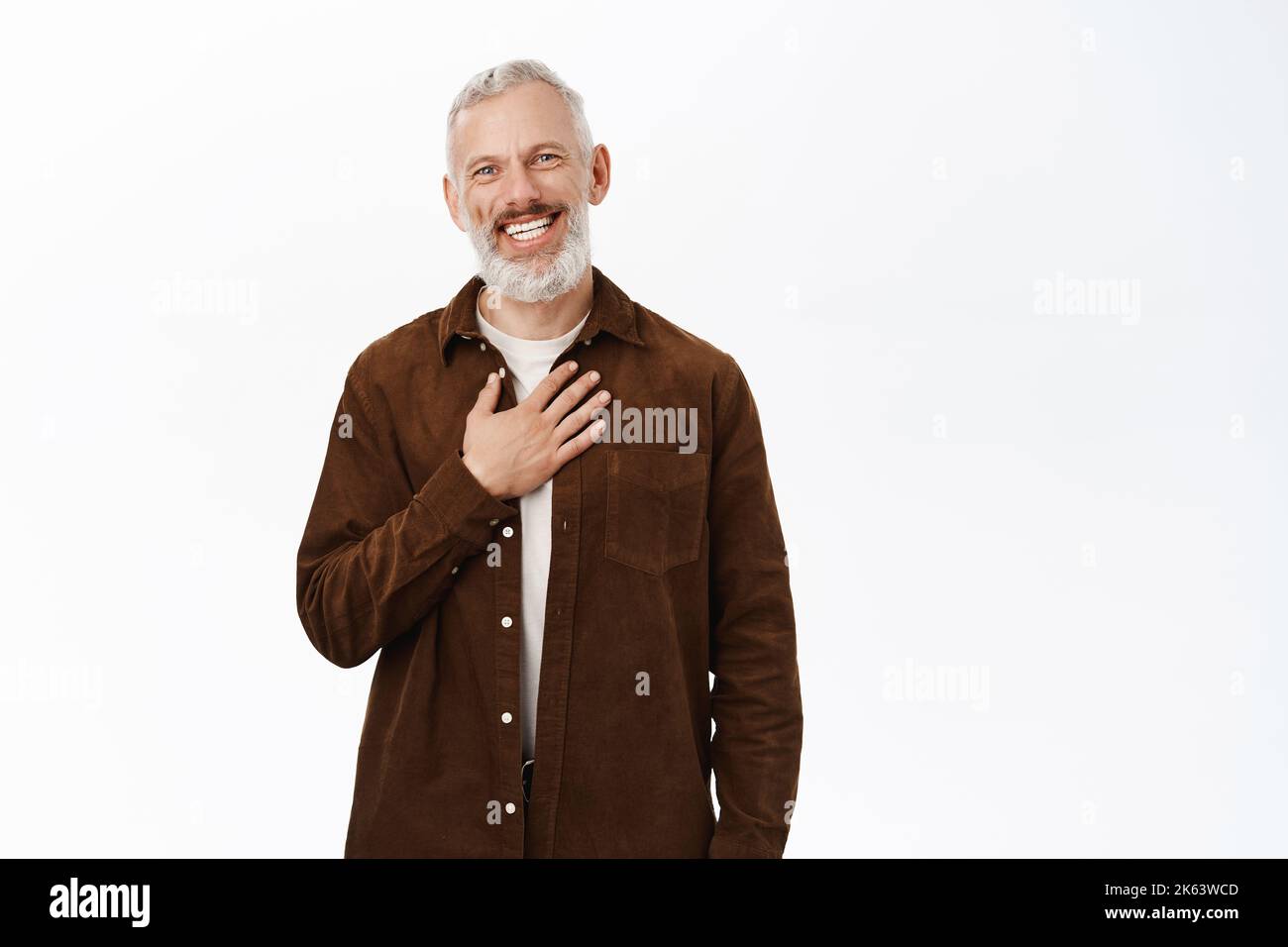 Image of senior guy, old man being touched, holding hands on chest ...
