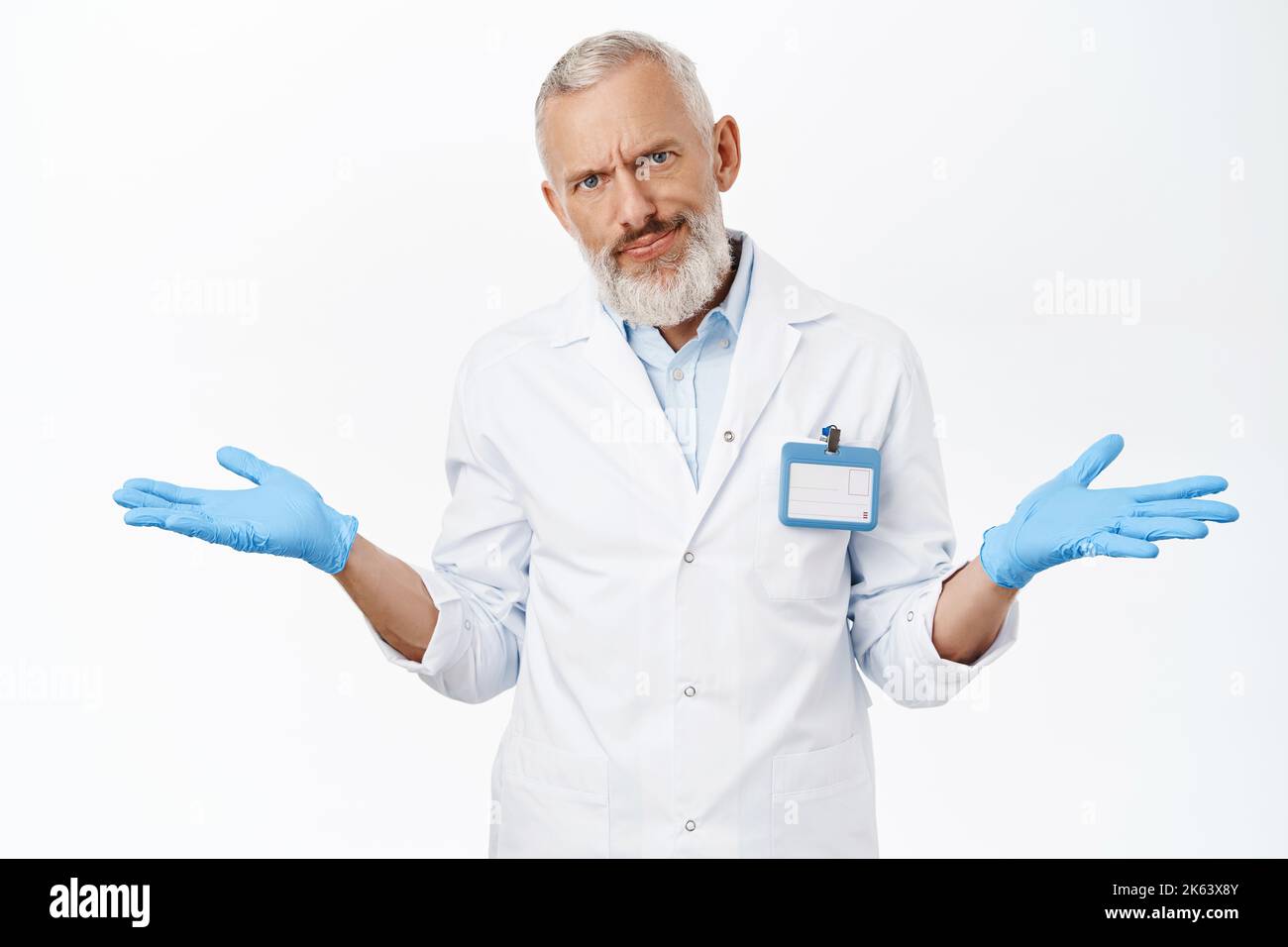 Confused doctor in uniform, healthcare worker shrugging shoulders and ...