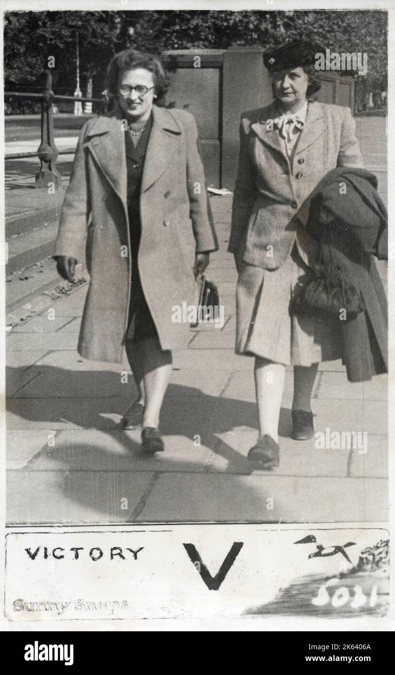 Two Smart ladies - Candid Street 'Walking' photograph Stock Photo - Alamy