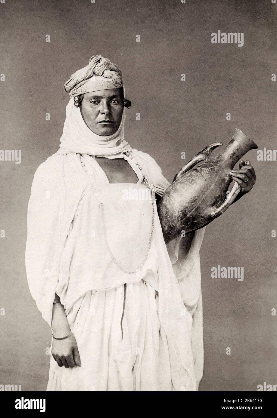 Vintage 19th century photograph: Portrait of a North African woman with ...