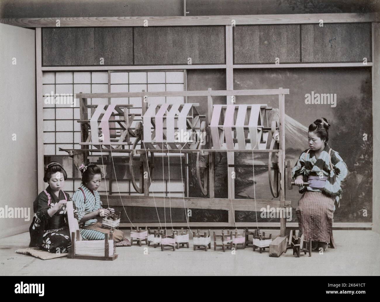 Spinning silk threads, Japan. Vintage 19th century photograph Stock ...