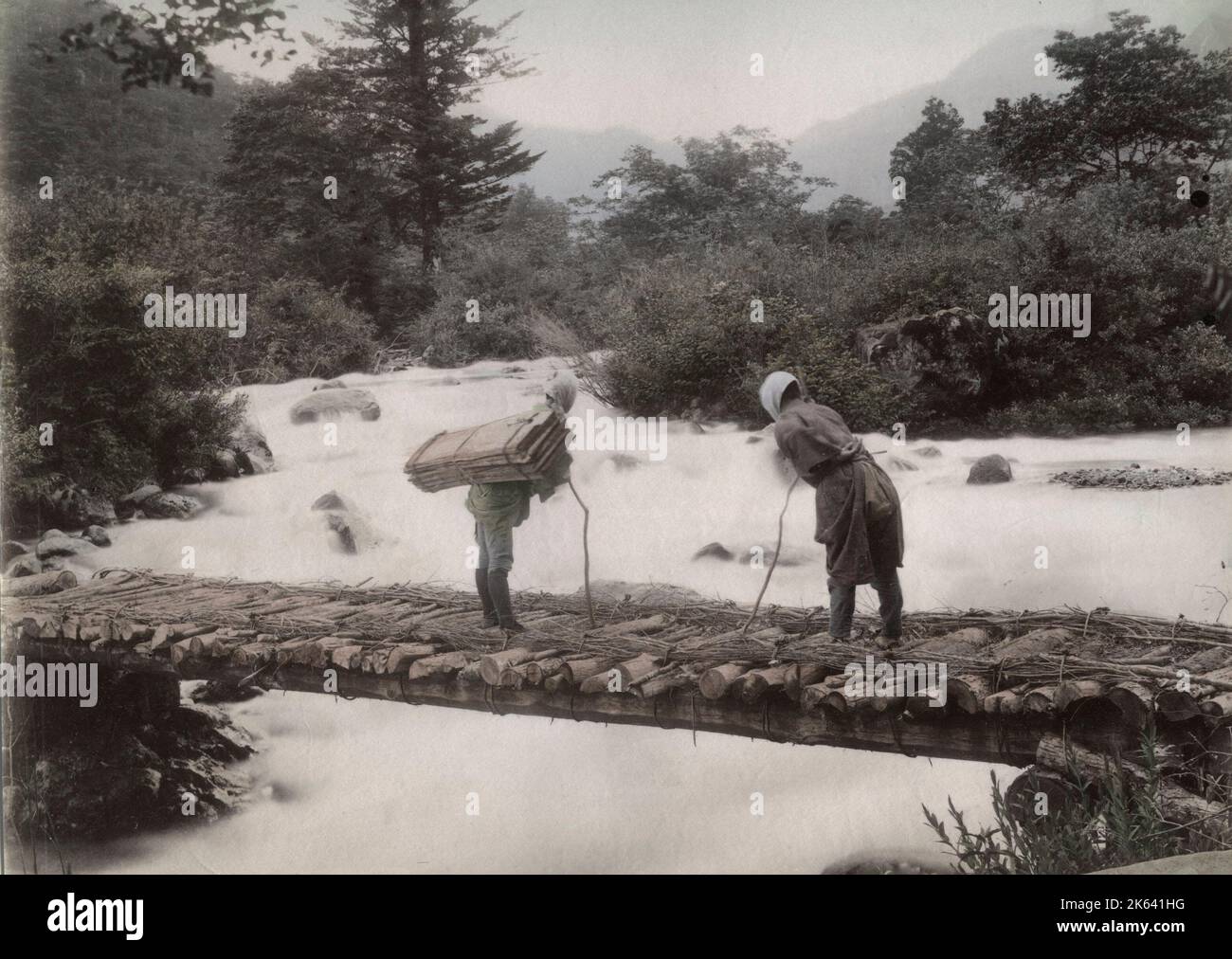 Porters on a bridge over the Daiya River, Nikko, Japan. Vintage 19th ...