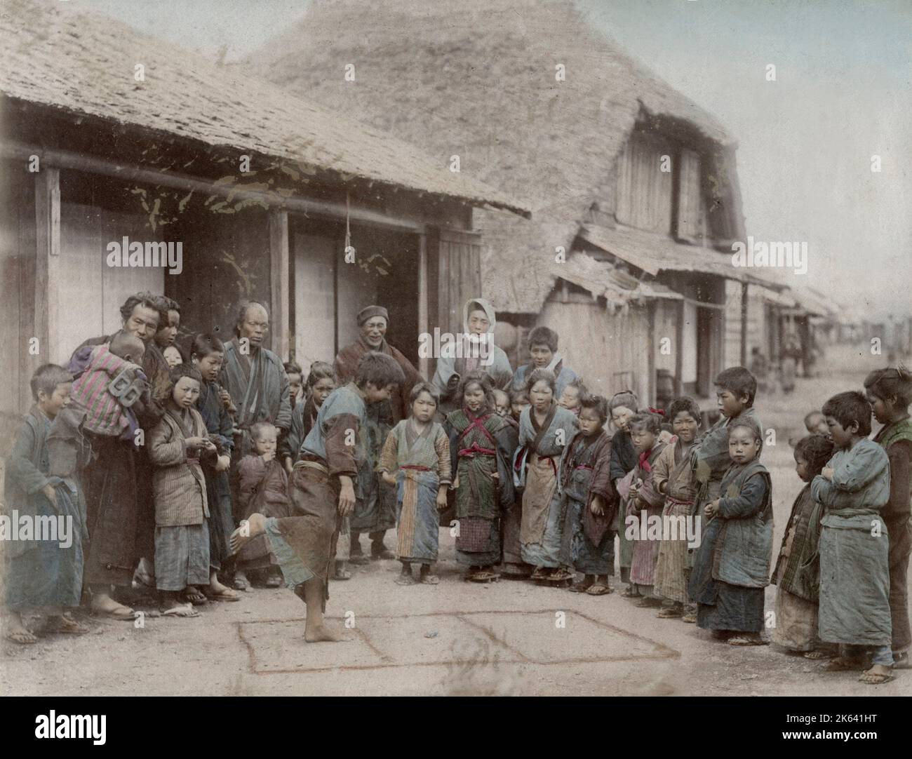 Children playing hopscotch, Japan. Vintage 19th century photograph ...