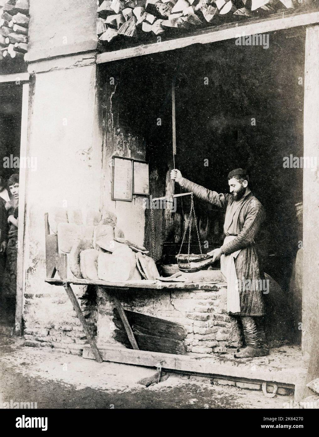 Caucasus Georgia Tiflis Tblisi - a baker at work baking bread. Vintage ...