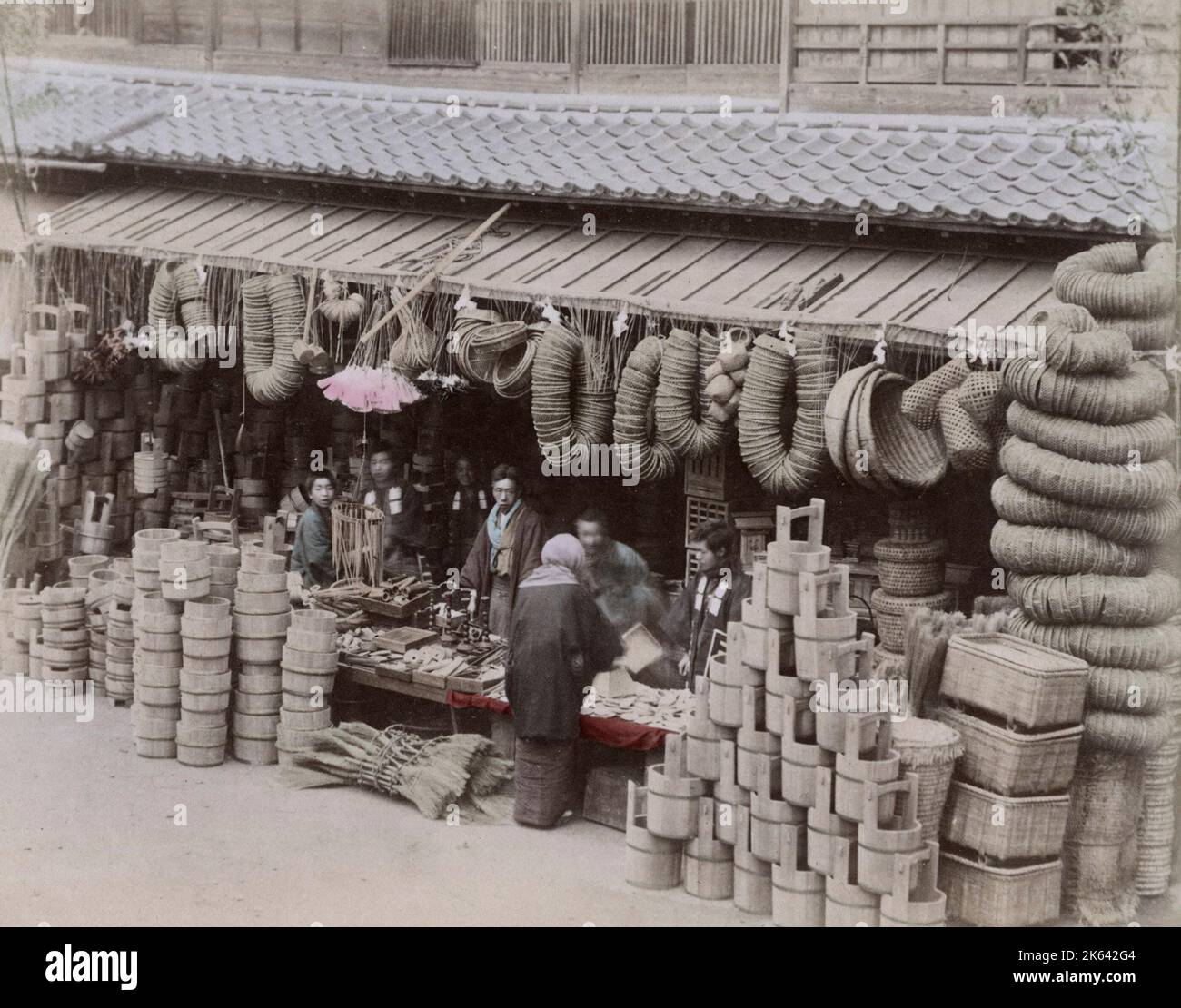 Hardware store selling buckets and baskets, Japan, late 19th century ...