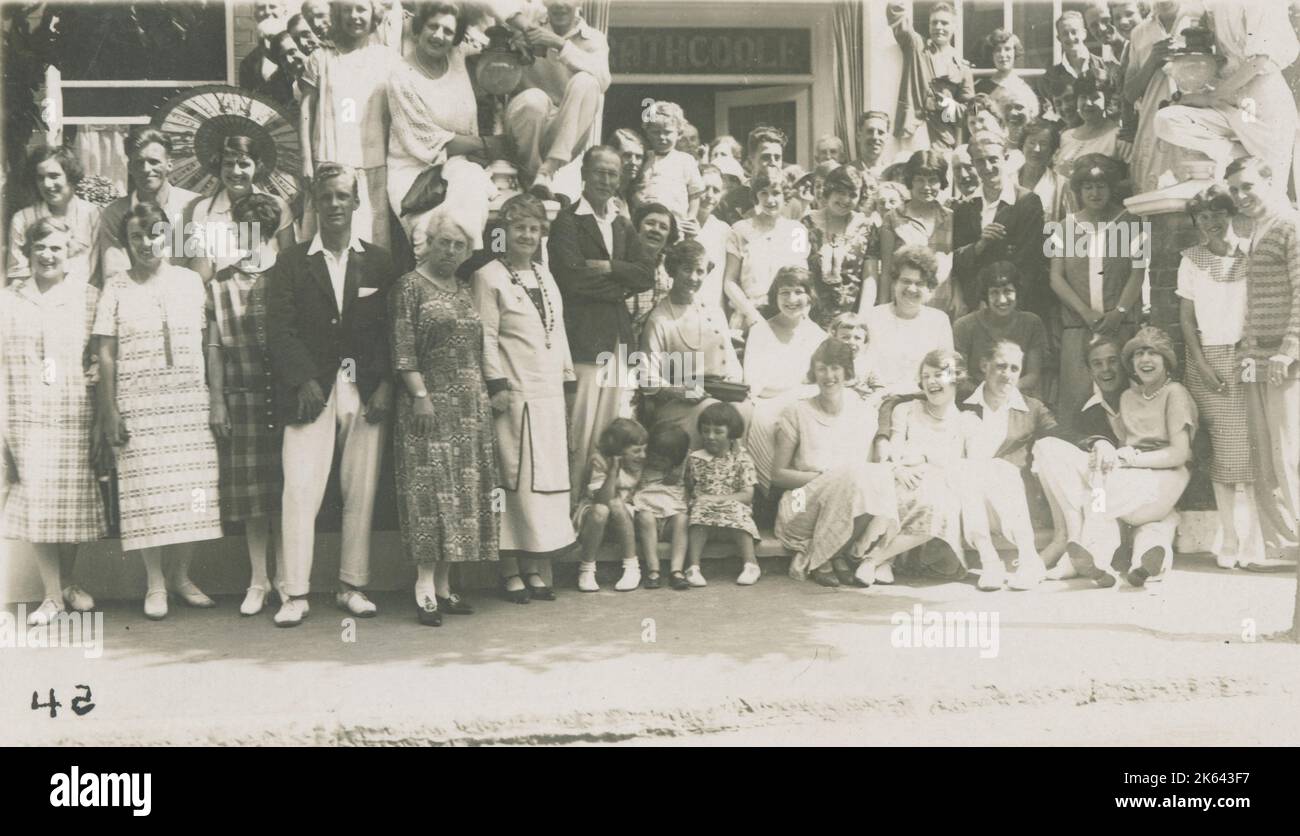 A group of happy holidaymakers at the Rathcoole guest house, pose for a ...