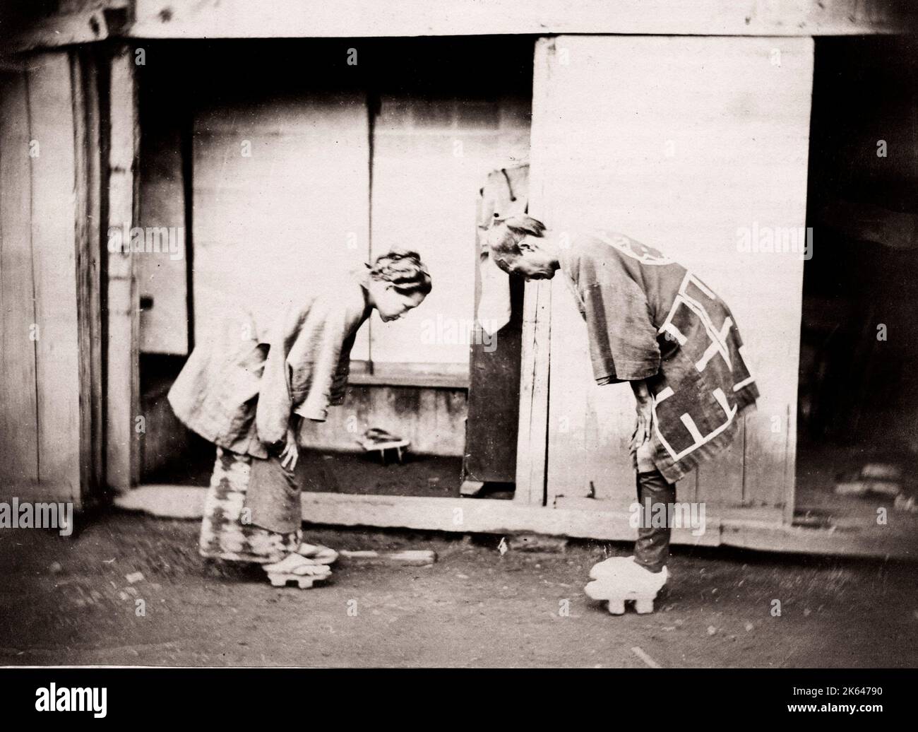 1870's Japan - two people greeting each other - from 'The Far East ...