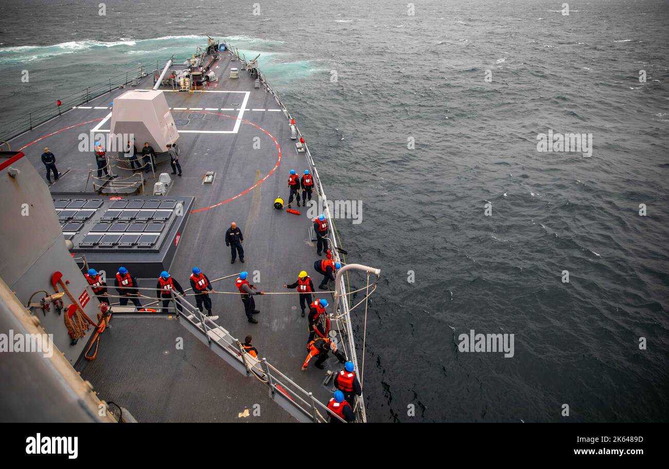 SEA OF HEBERDIES (Oct. 3, 2022) Sailors prepare to recover a simulated ...