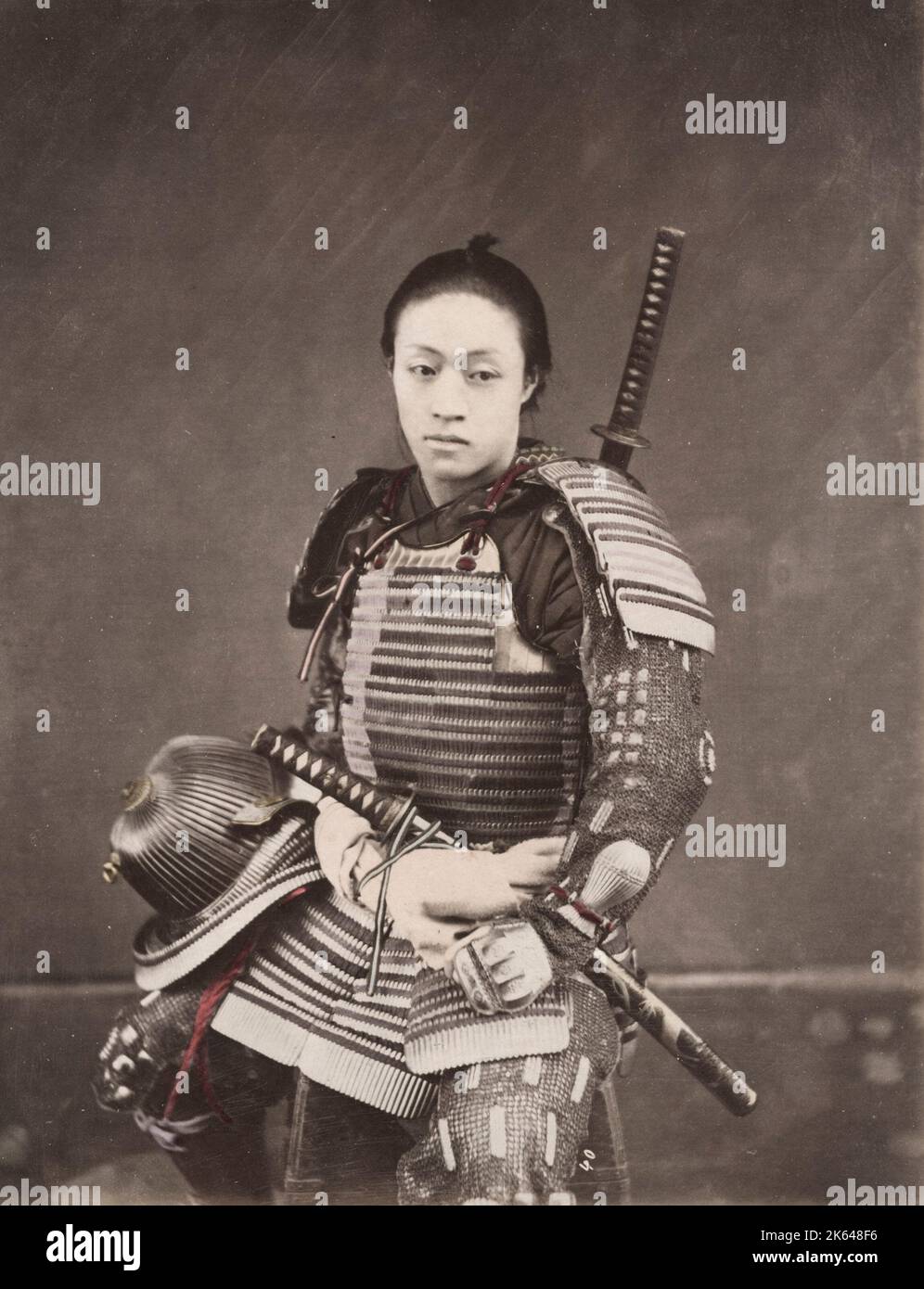 Vintage 19th century photograph: Young samurai with armour and two ...