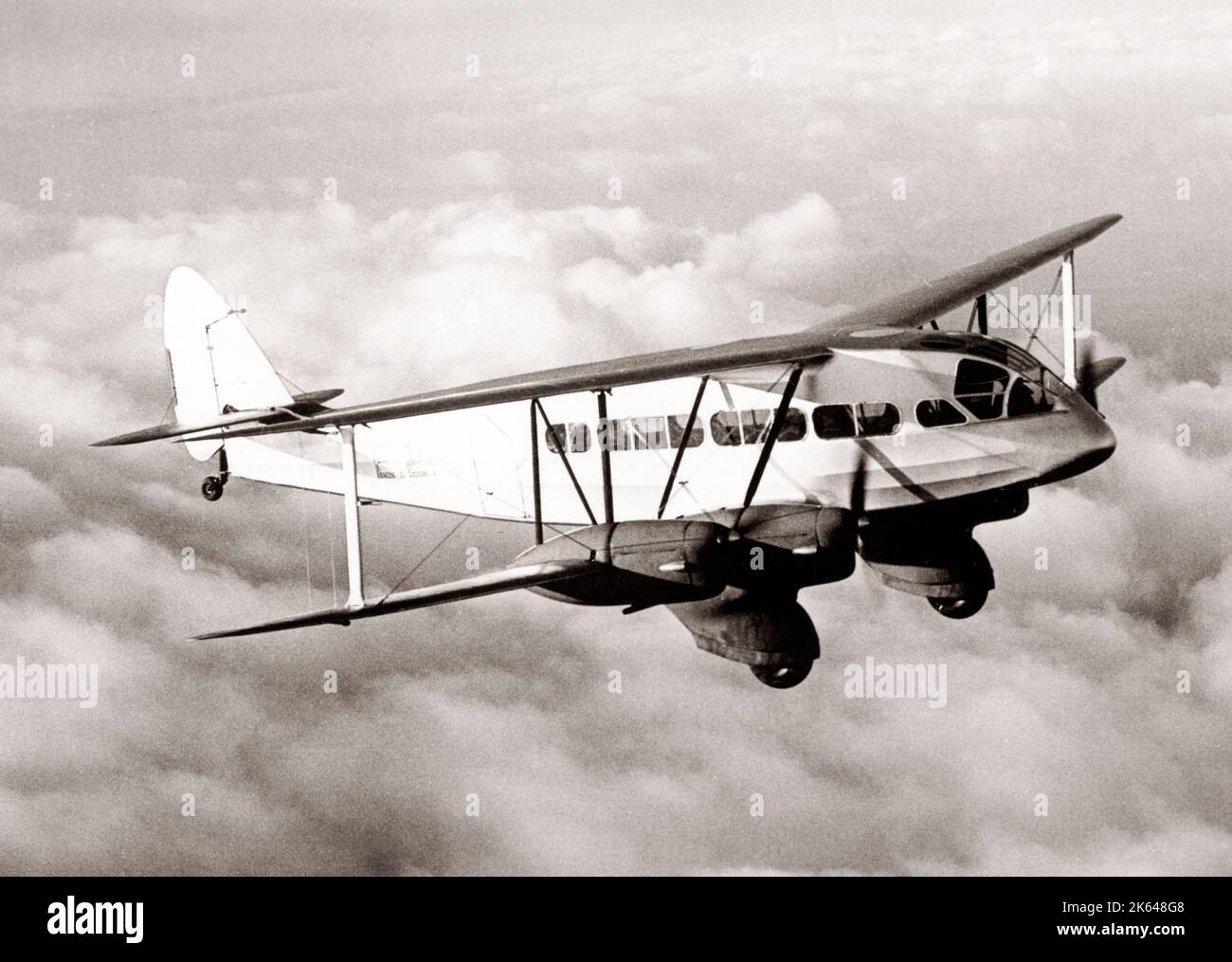 DeHavilland biplane airliner in flight, 1934 Stock Photo - Alamy
