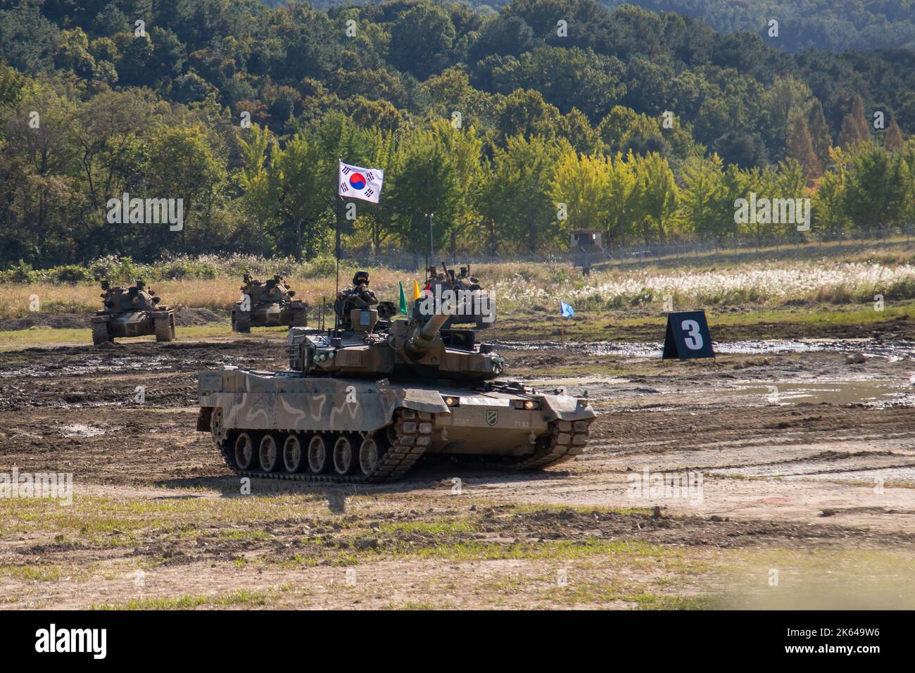Spectators check out a tank demonstration at the Gyeryong World ...