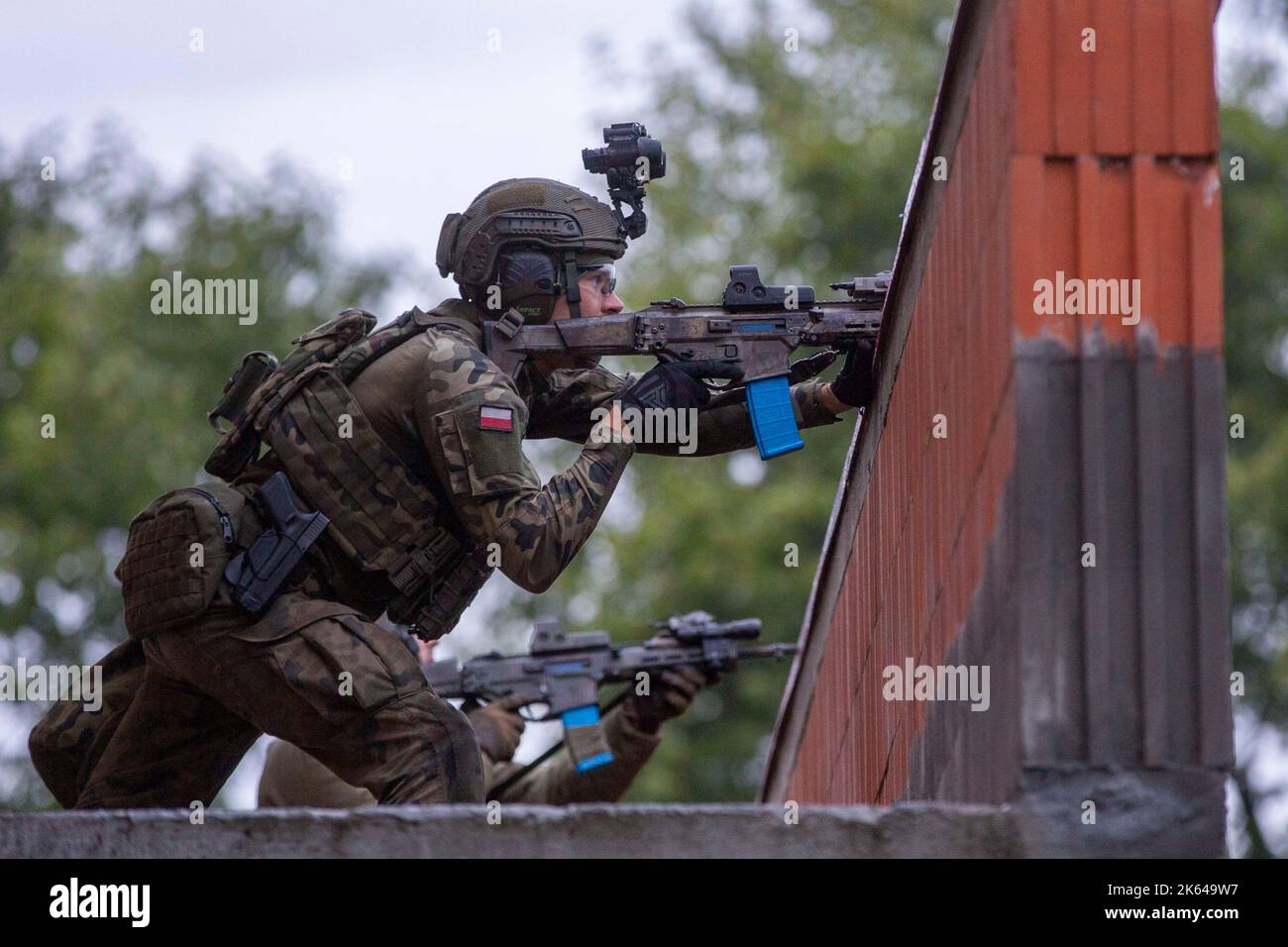 A Polish soldier assigned to the 1st Territorial Defense Forces Brigade ...