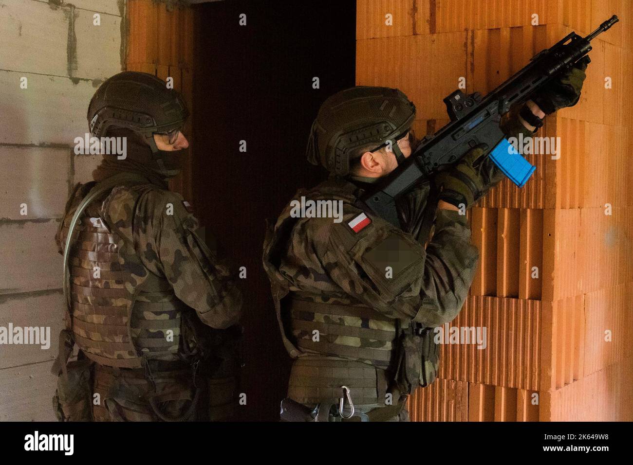 Soldiers assigned to the Polish 1st Brigade Territorial Defense Forces ...