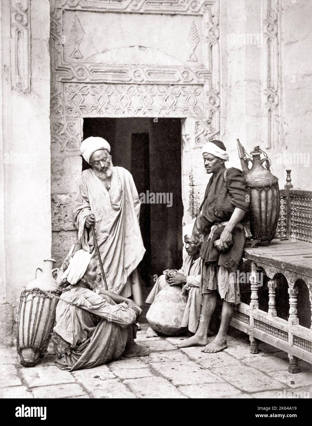 Group of water carriers, Cairo, Egypt, c.1880's Stock Photo - Alamy
