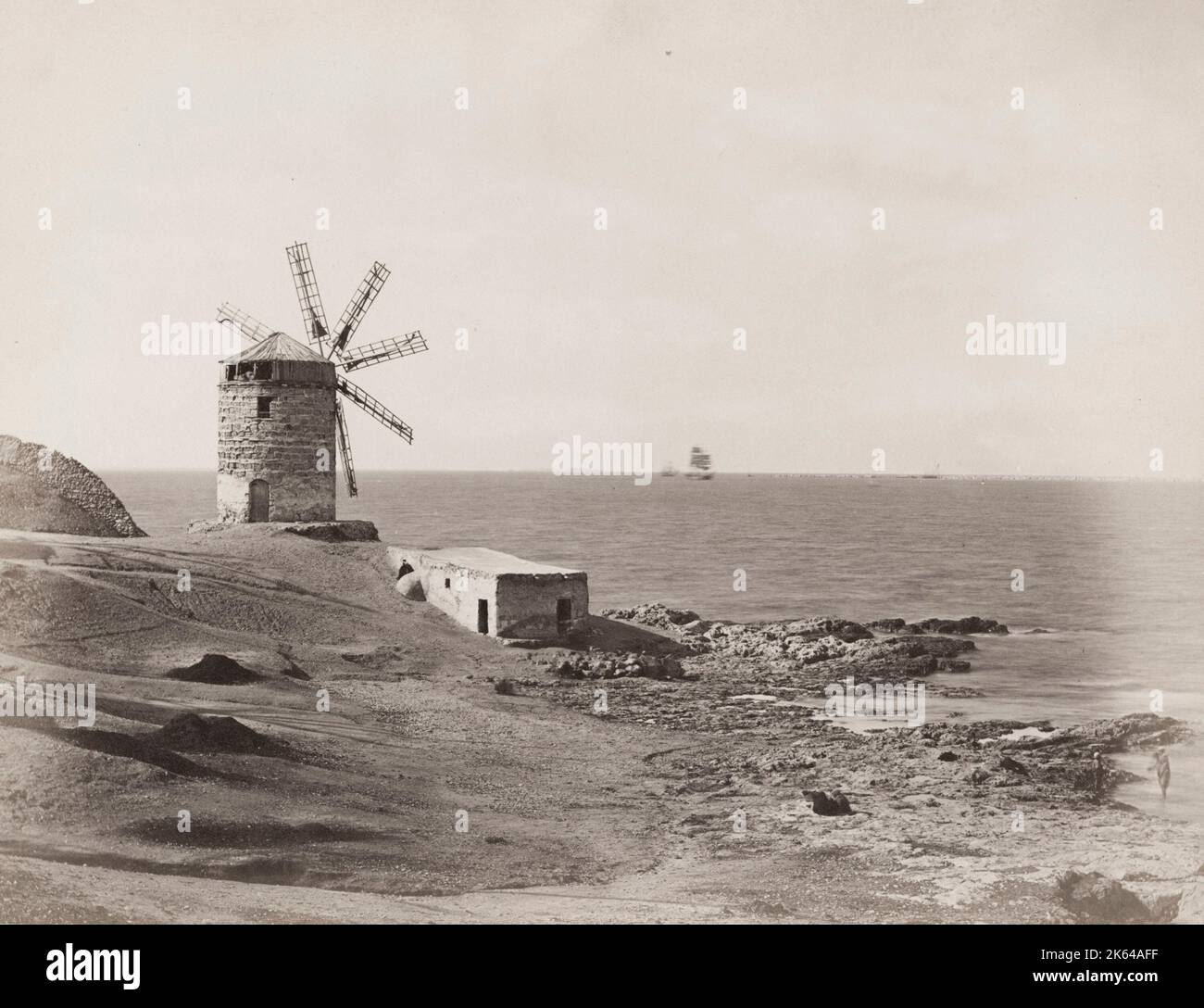 Vintage 19th century photograph: Egypt, windmill on a shore Stock Photo ...
