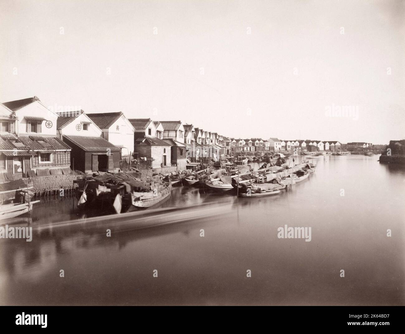 Vintage 19th century photograph: view of wharves and godowns or ...