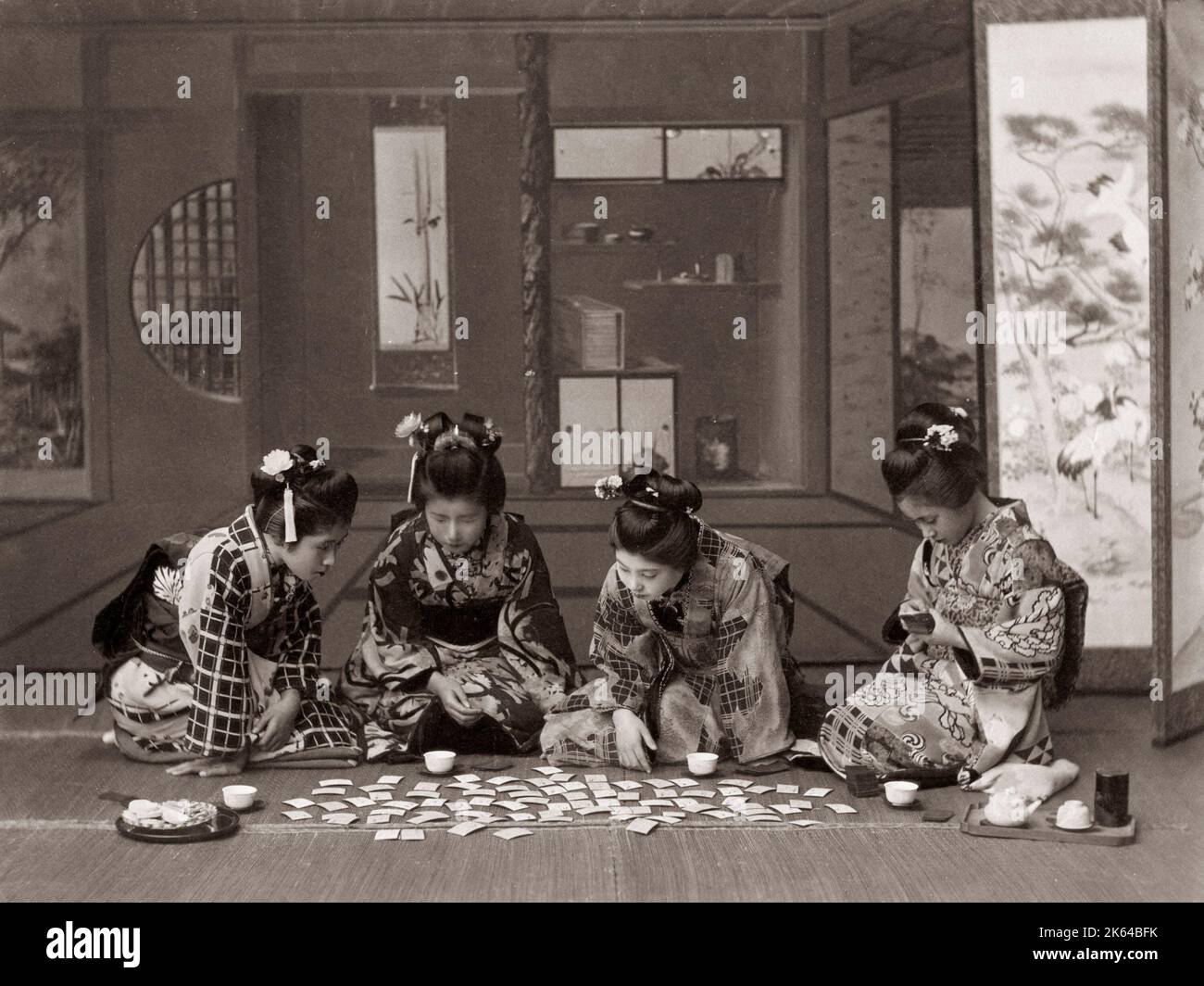 Geishas playing cards, Japan, c.1890 Stock Photo - Alamy
