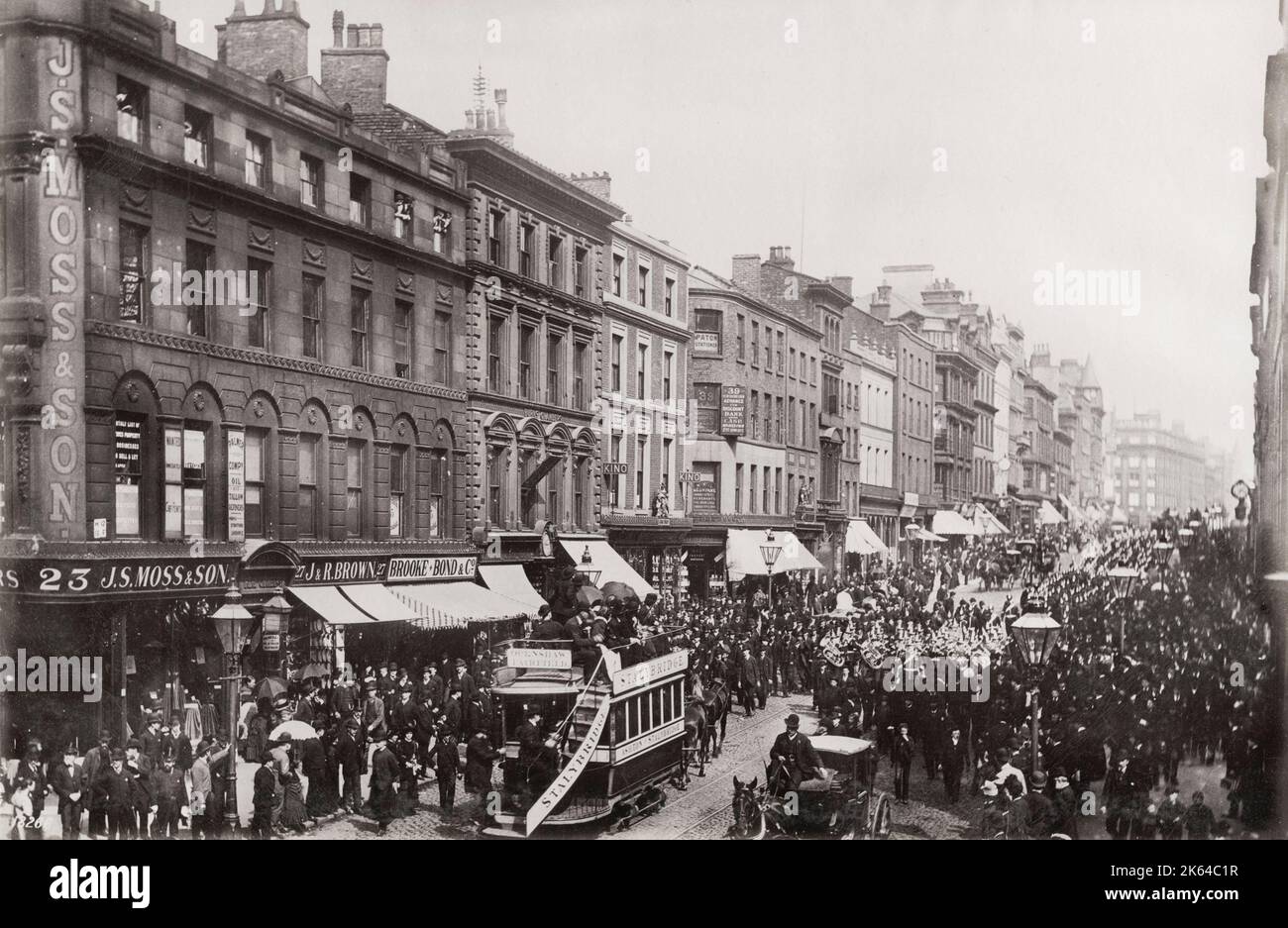 Vintage 19th century photograph: procession down a busy London street ...