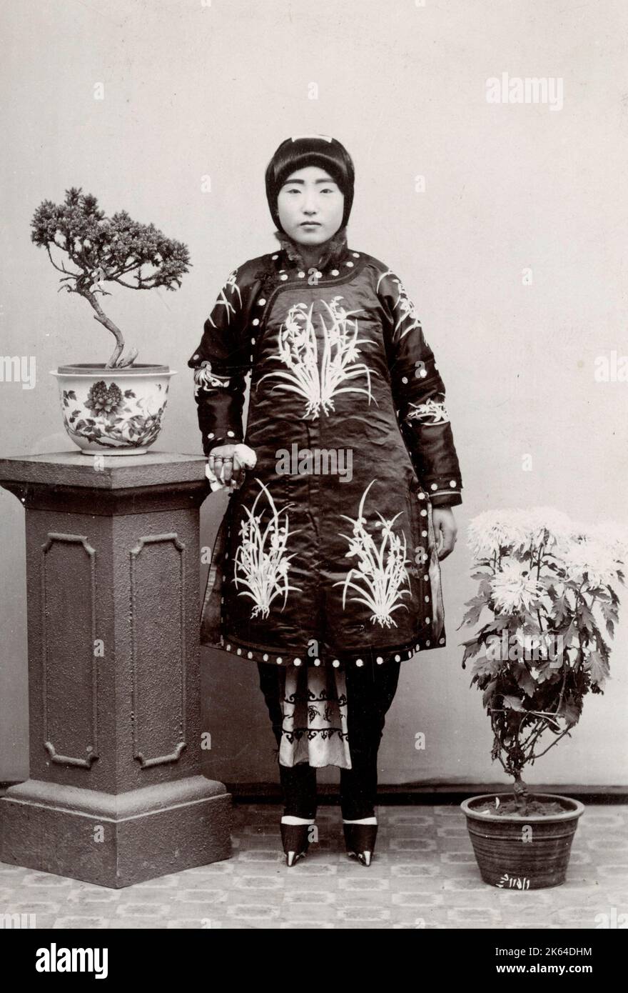 Early 20th century photograph: Young Chunese woman, ornate robe, bound ...