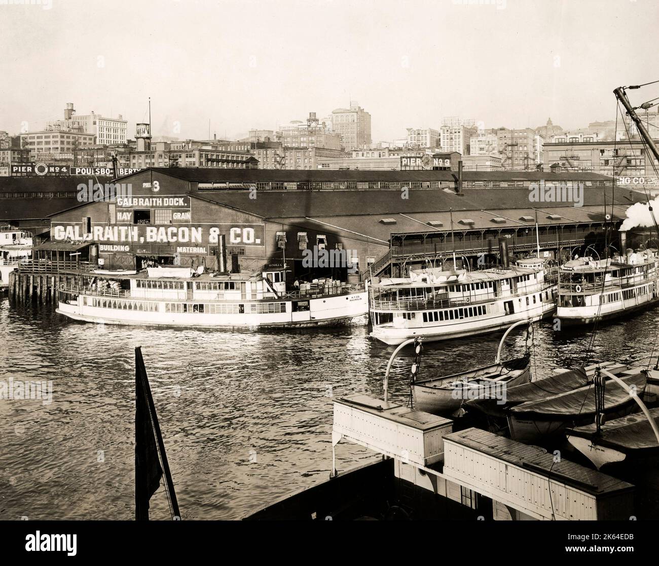 Early 20th century vintage press photograph - warehouses and passenger ...