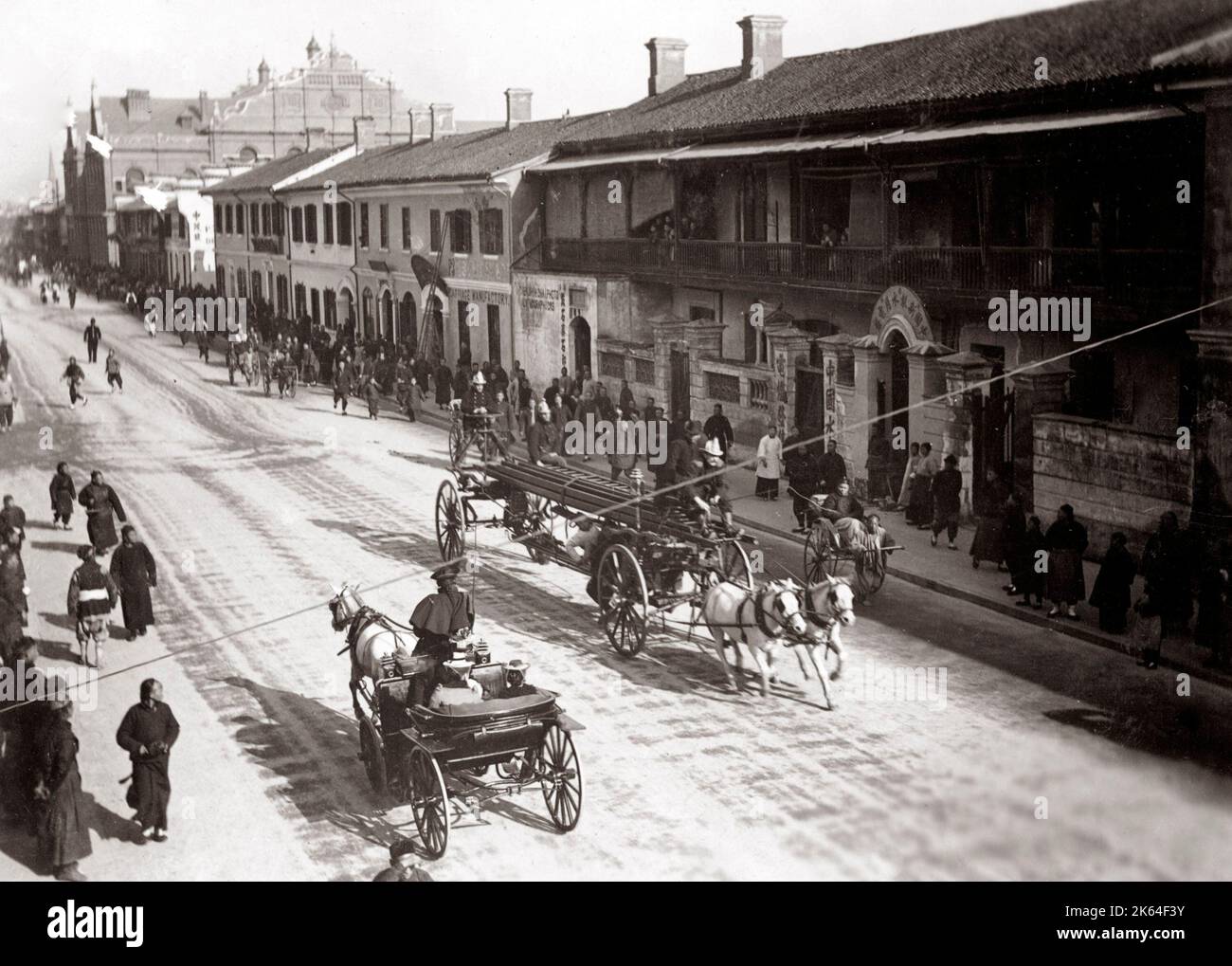 Firemen and horse-drawn ladder, Shanghai, China c.1890 Stock Photo - Alamy