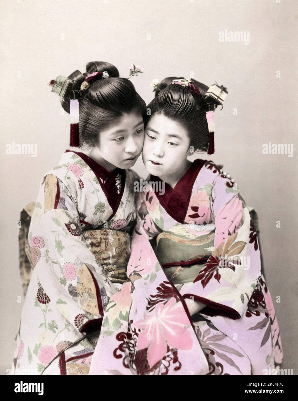c. 1880s Japan - two geishas cheek to cheek Stock Photo - Alamy