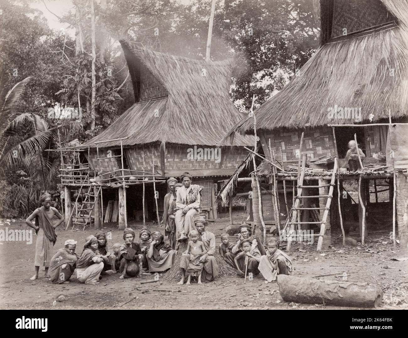 Vintage 19th century photograph: Singapore, native family group outside ...