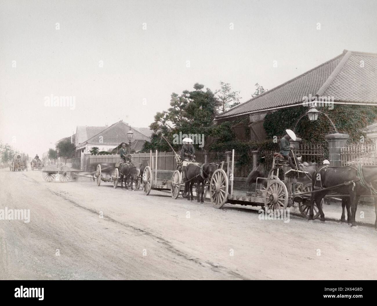 Vintage late 19th century photograph: Horse carts, cargo wagons, Bund ...