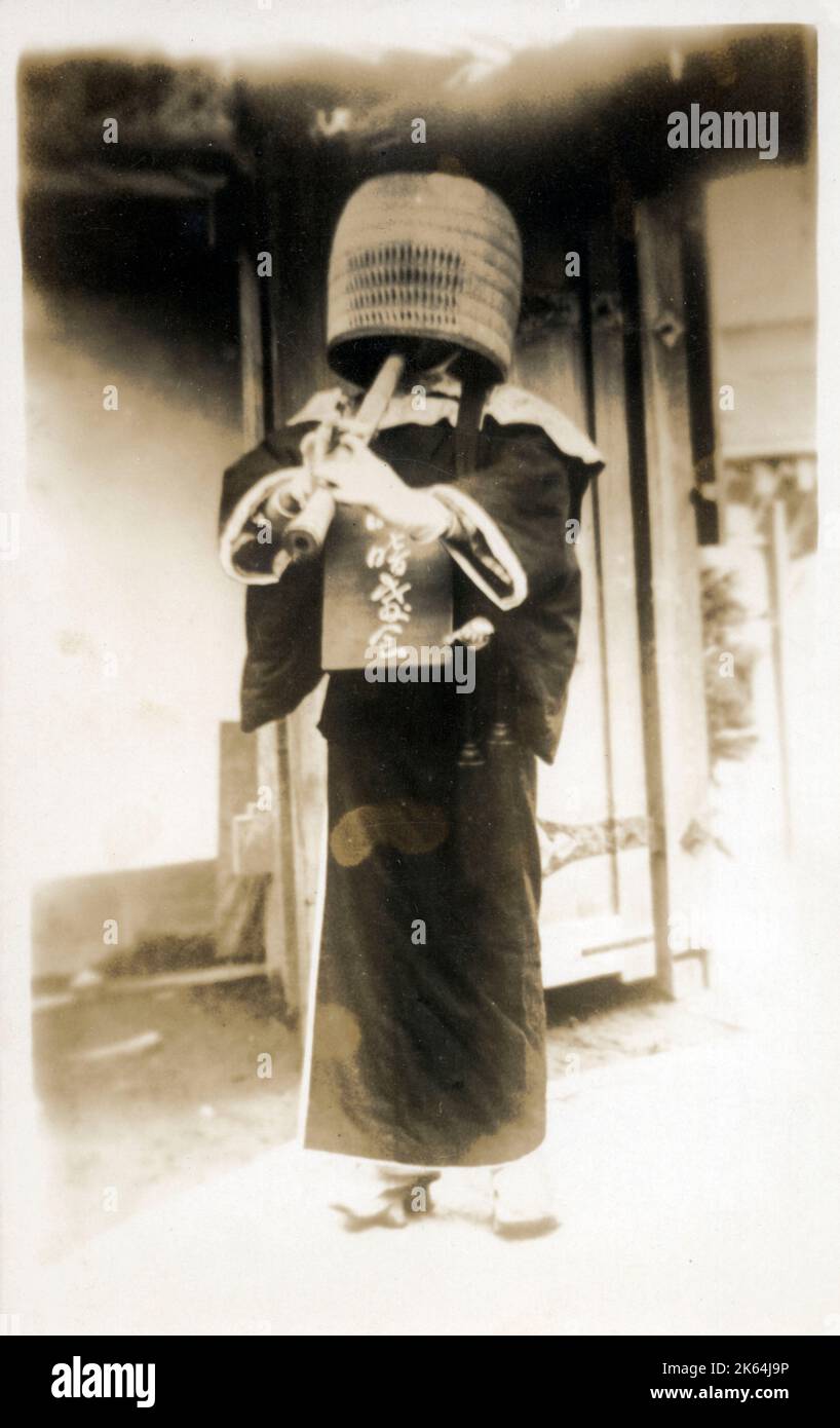 Buddhist monk playing japanese flute hi-res stock photography and ...