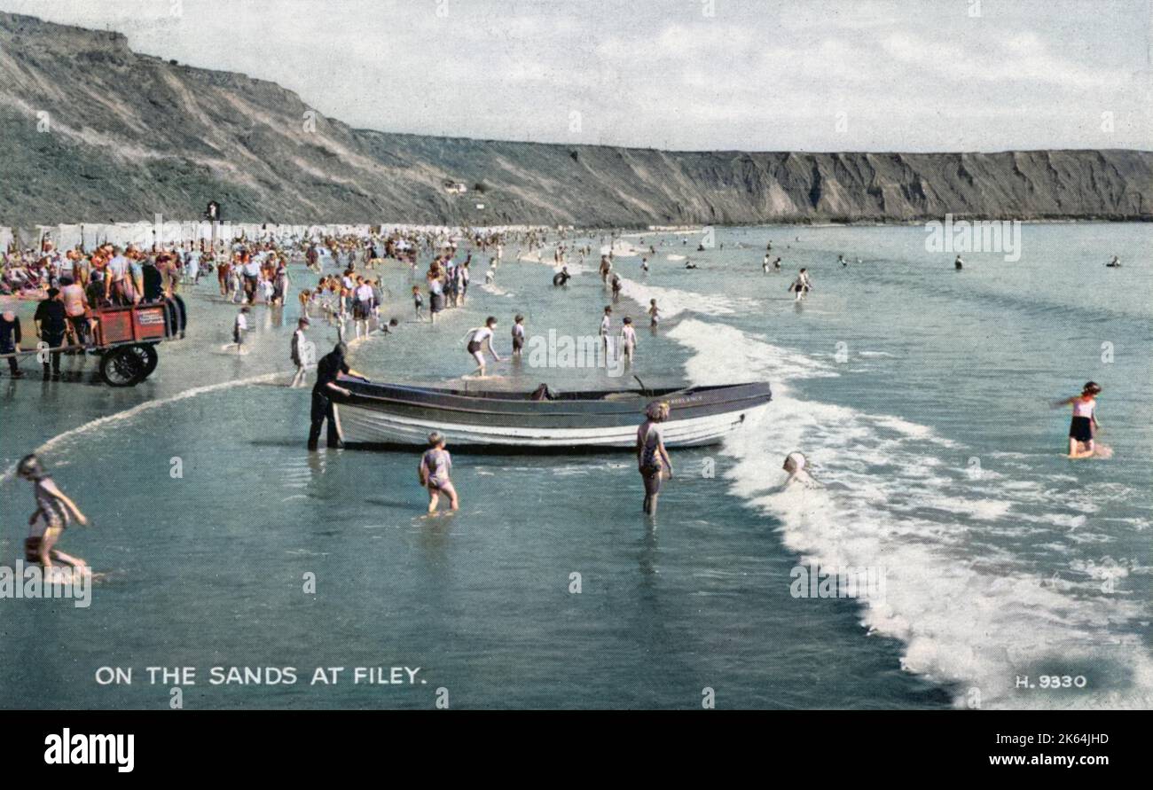 Holidaymakers on the sands at Filey, North Yorkshire -- the beach is ...