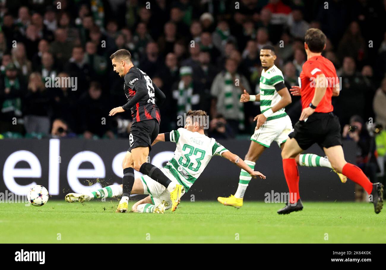 Celtic's Matt O'Riley tackles RB Leipzig's Miguel Andre Silva during ...