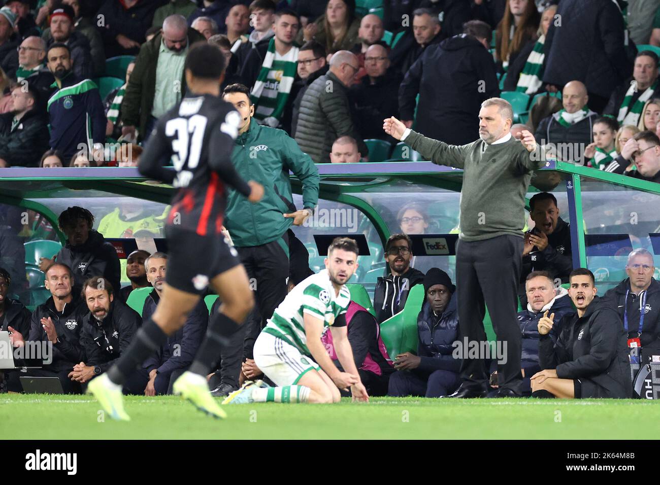 Celtic manager Ange Postecoglou (right) reacts during the UEFA ...