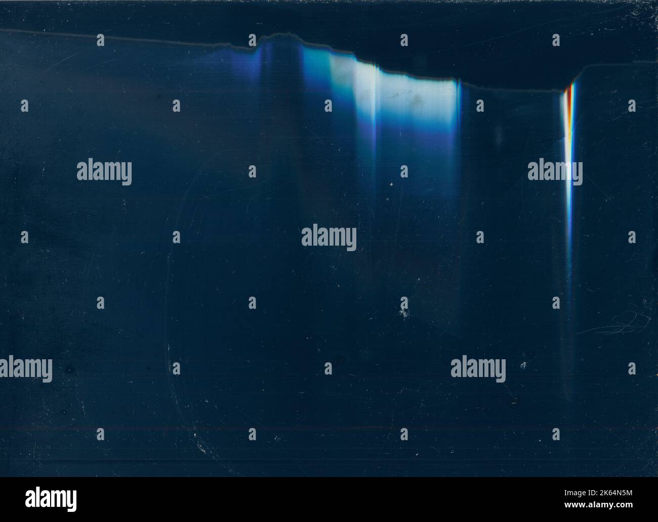 distressed filmstrip glowing flecks dark overlay Stock Photo - Alamy