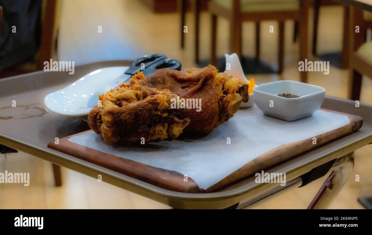 A home-cooked crispy pata, a Filipino dish of deep-fried pork knuckles ...