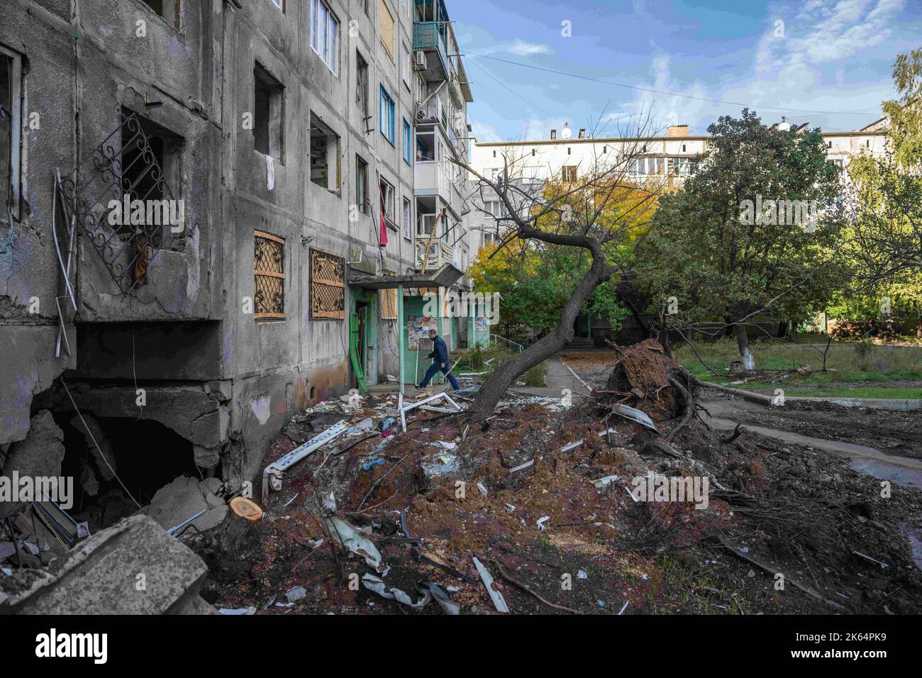 Bakhmut, Donetsk Oblast, Ukraine. 4th Oct, 2022. A man walks into an ...