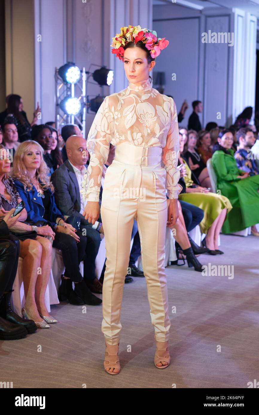 Madrid, Spain. 11th Oct, 2022. A model walks the runway at the Damaris ...