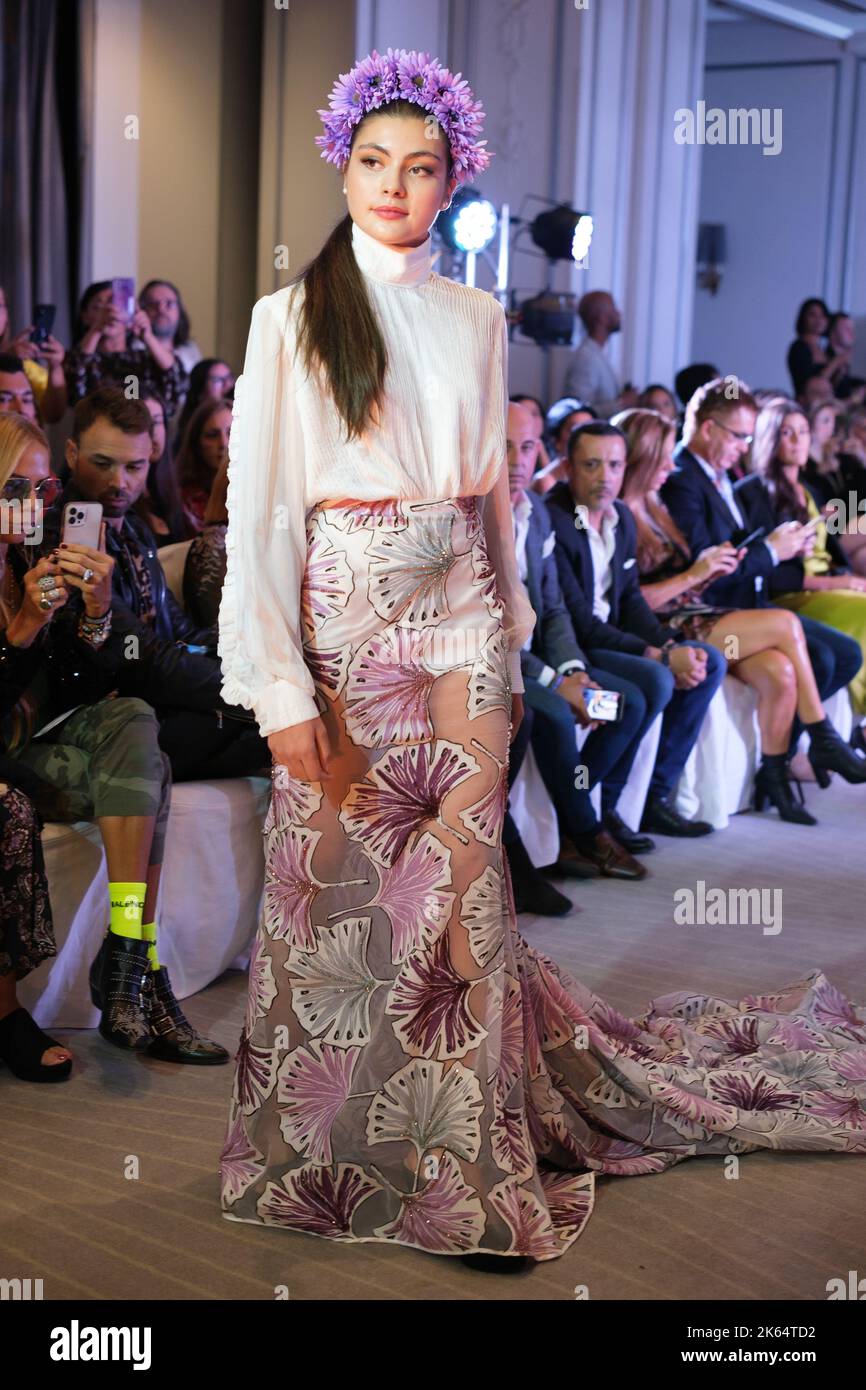 Madrid, Spain. 11th Oct, 2022. A model walks the runway at the Damaris ...
