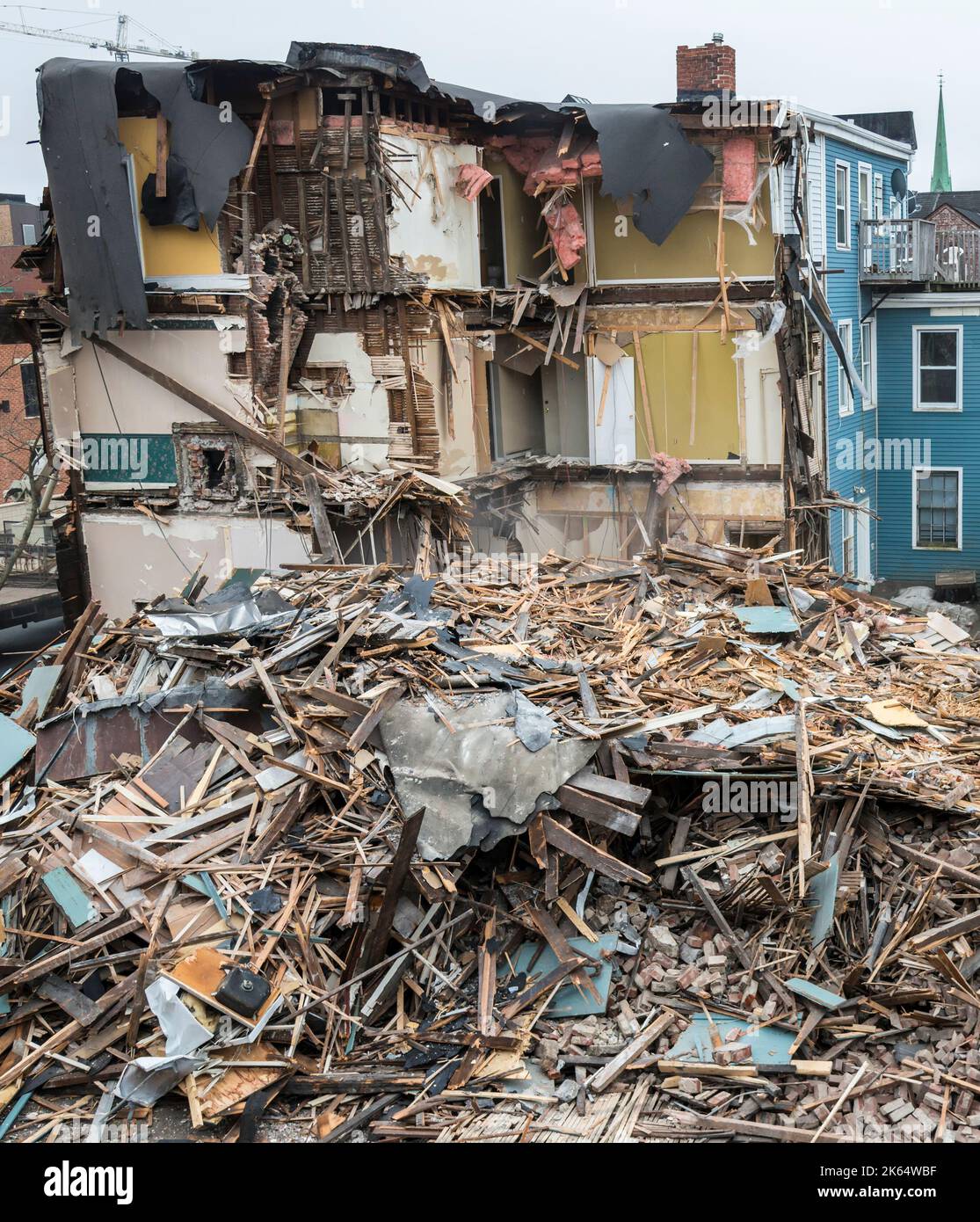 A partially destroyed building. Most of the building lies as a pile of ...